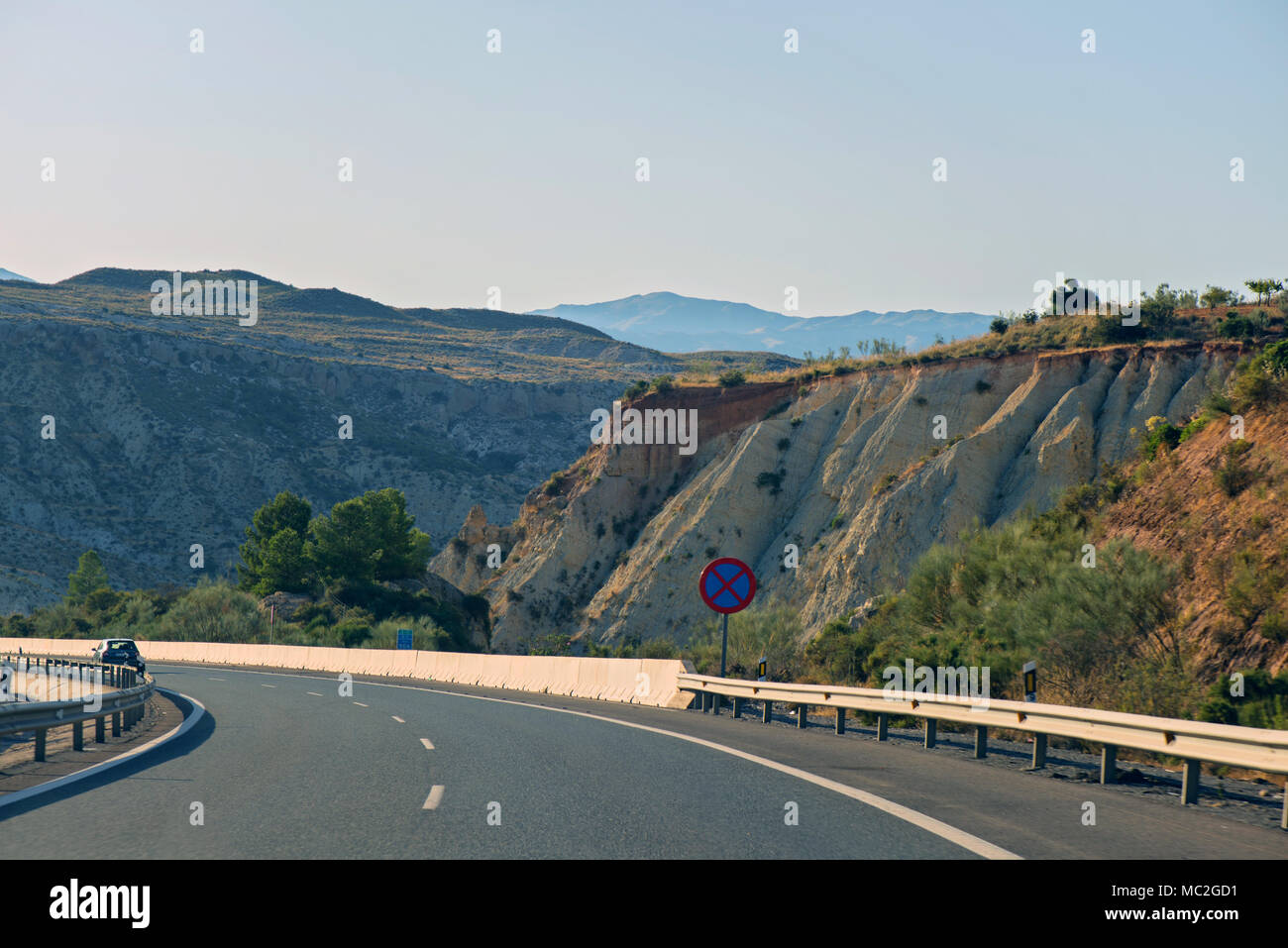 Curve of road in mountain in Andalusia, Spain Stock Photo - Alamy