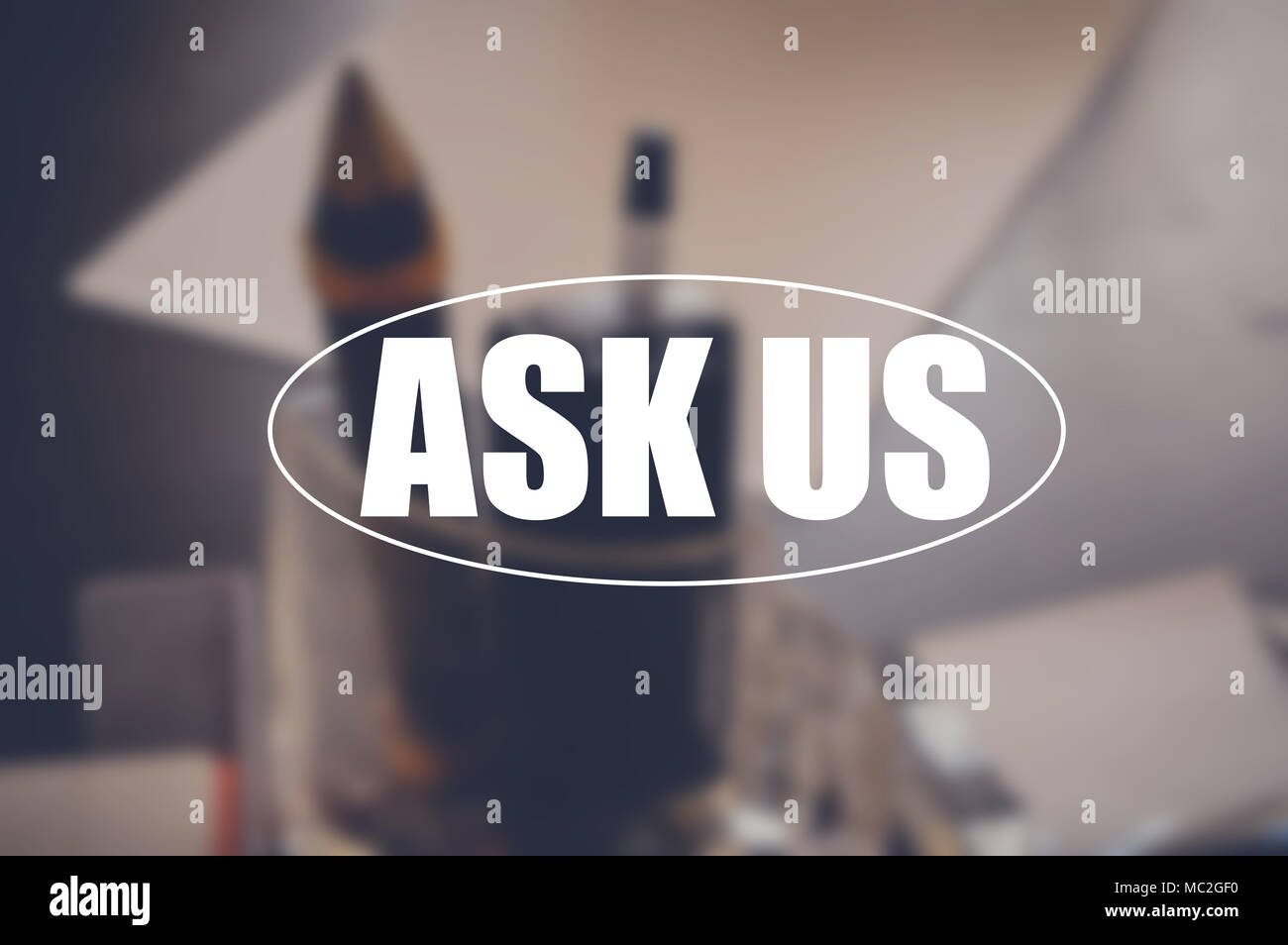 Ask us word with blurring background Stock Photo - Alamy