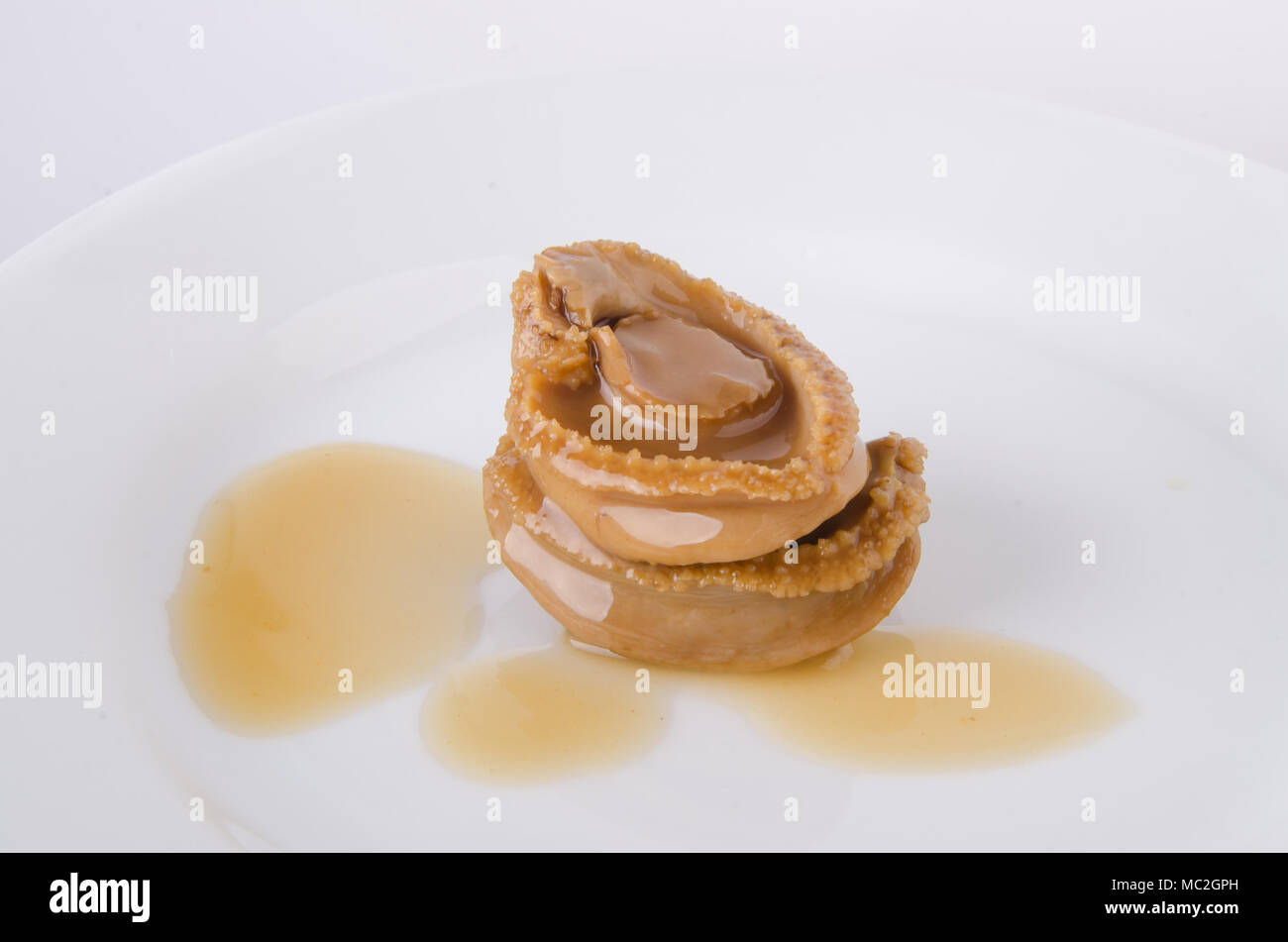 Abalones. Chinese cuisine abalone on the background Stock Photo - Alamy