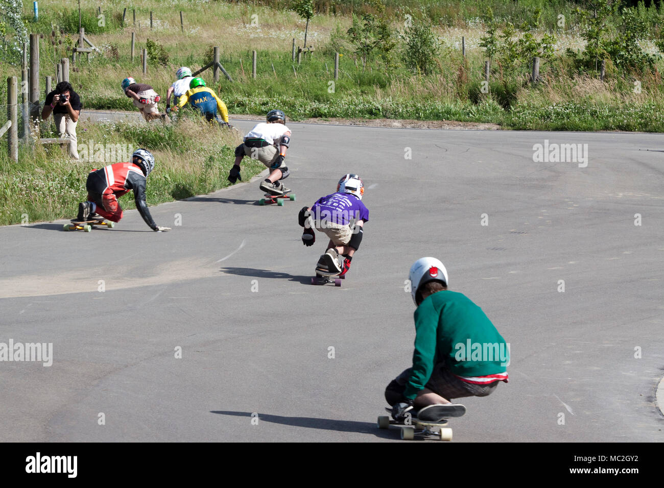 Longboarding, downhill racing on skateboards Stock Photo - Alamy