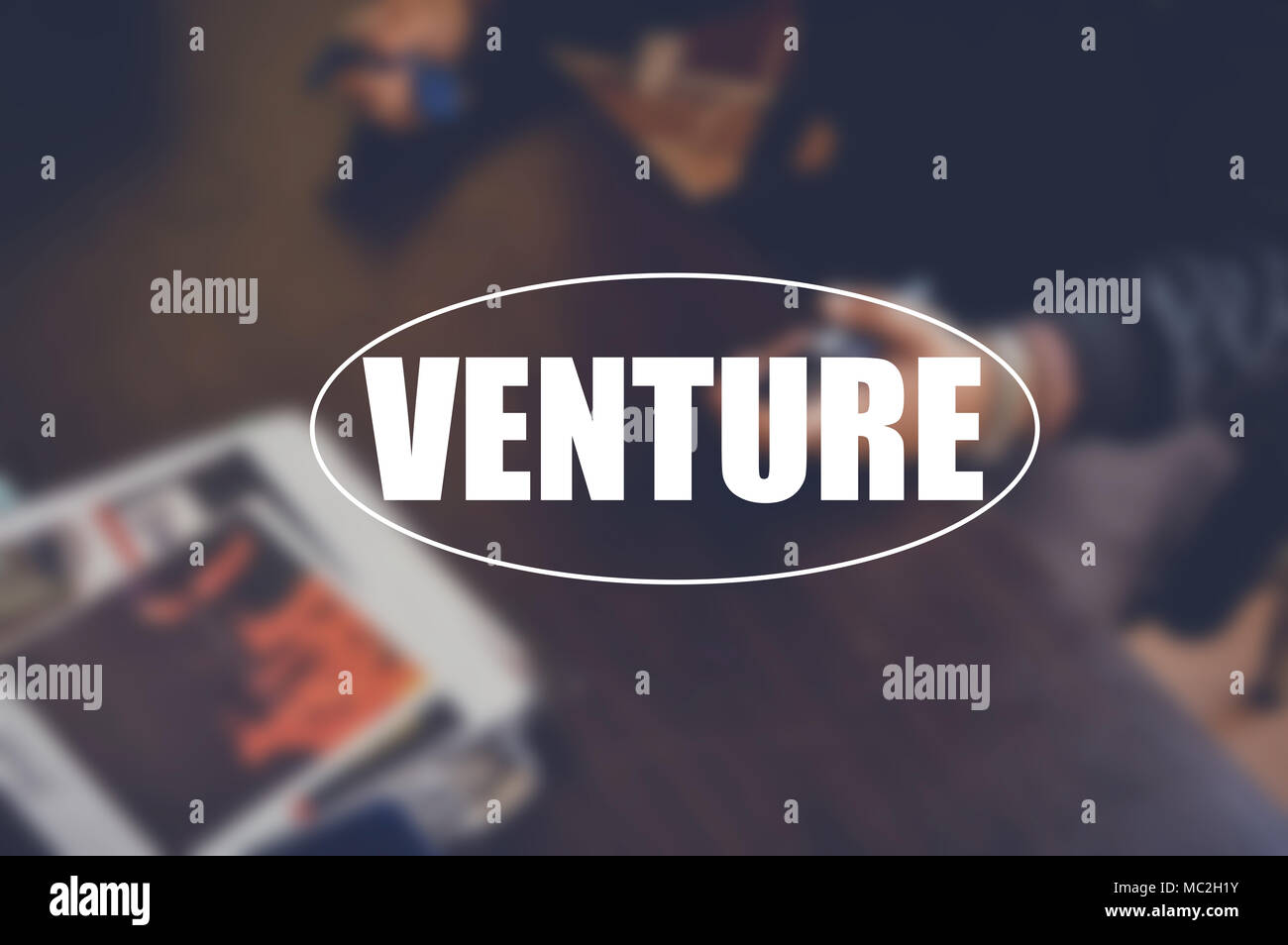 Venture word with blurring background Stock Photo - Alamy
