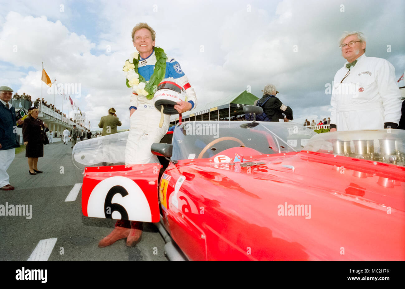 Driver Tony Dron at the Goodwood Revival meeting of 2002 Stock Photo ...