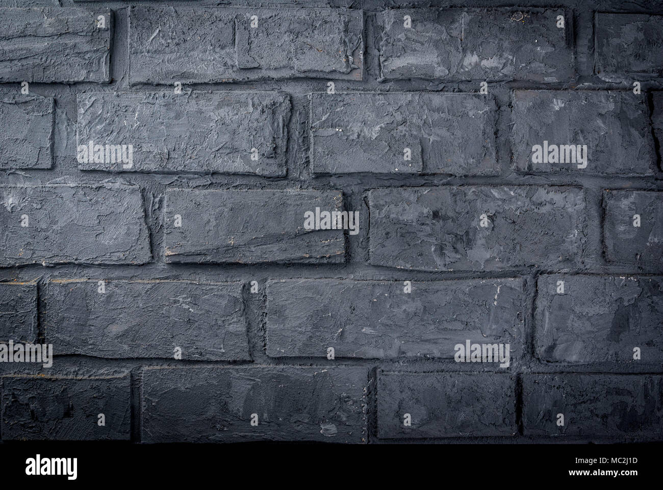 Old dark grey brick wall, background, horizontal Stock Photo - Alamy
