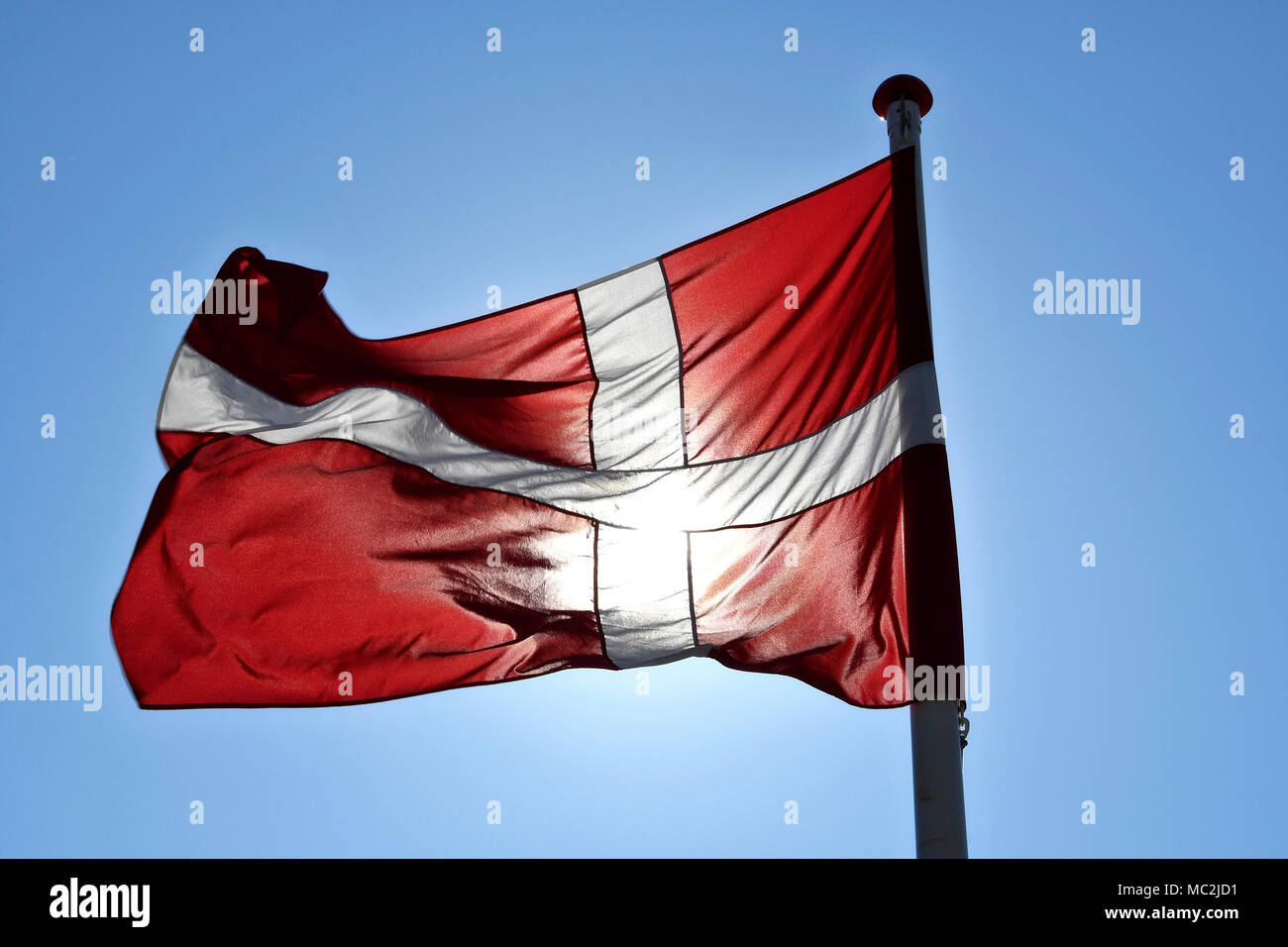 Danish flag in the wind Stock Photo - Alamy