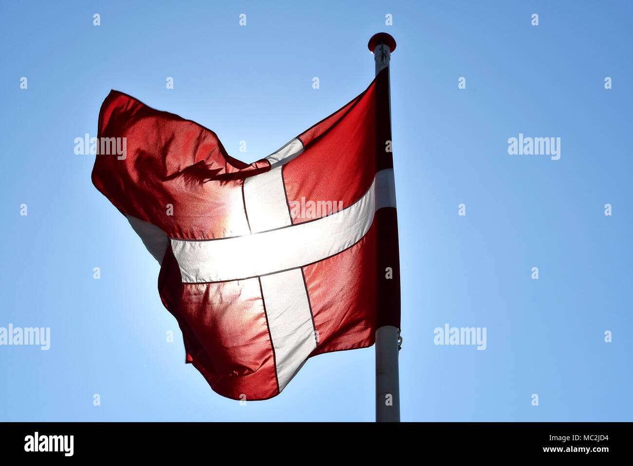Danish flag in the wind Stock Photo - Alamy