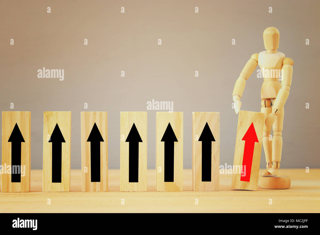 image of wooden dummy pick one from many wooden blocks. business ...