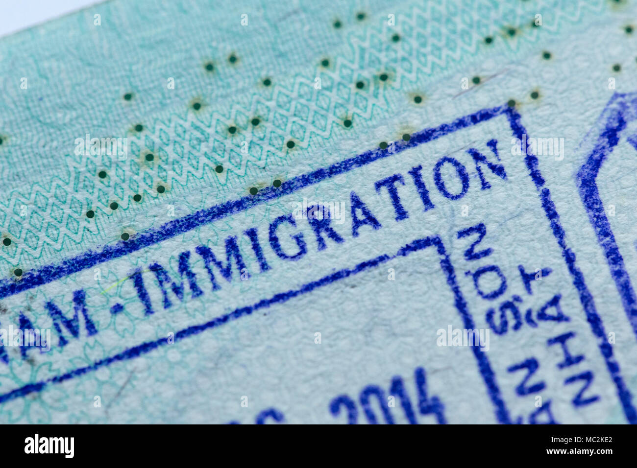 Immigration stamp in a passport Stock Photo - Alamy