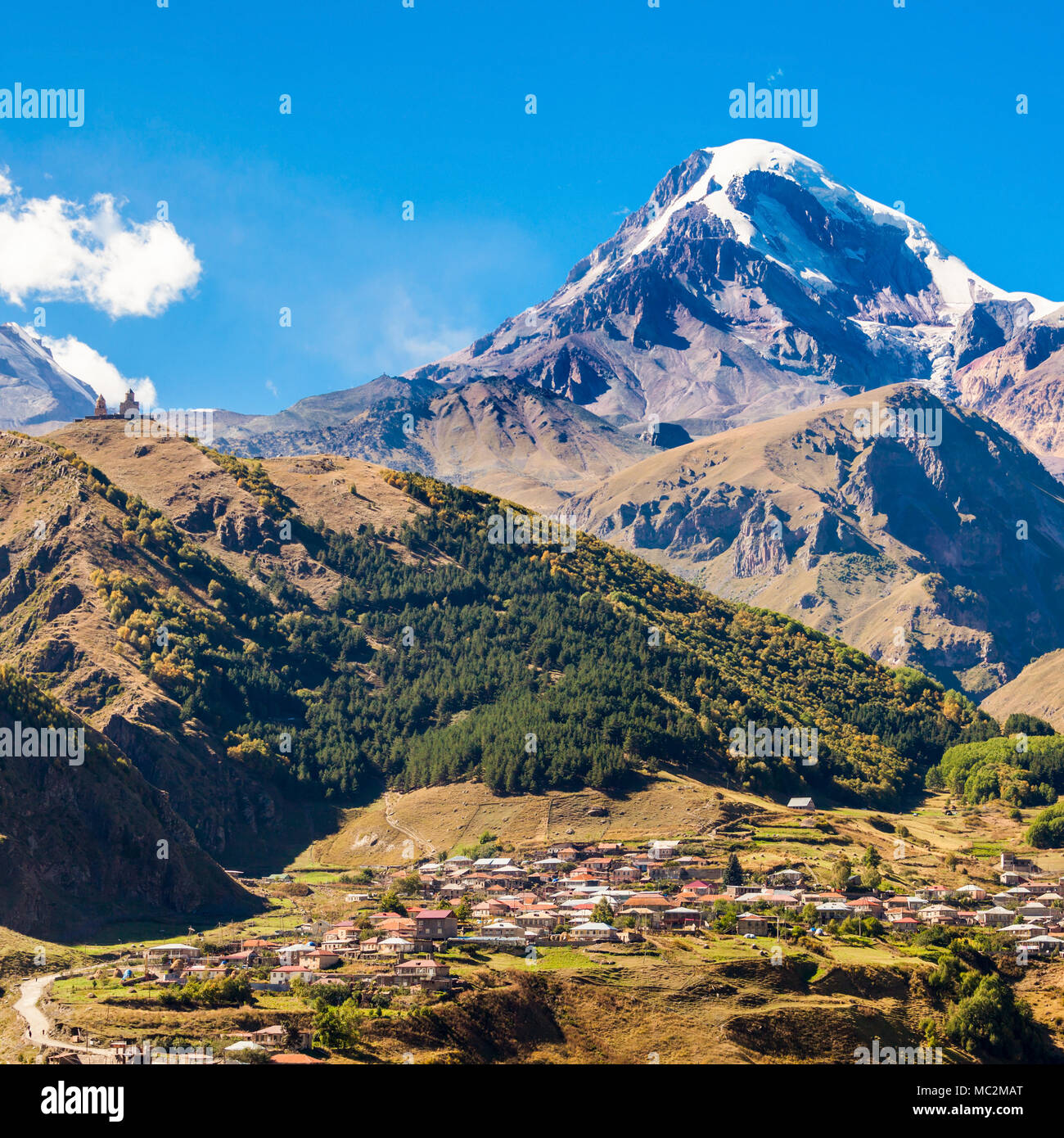 Mount Kazbek and Stepantsminda town in Georgia Stock Photo - Alamy