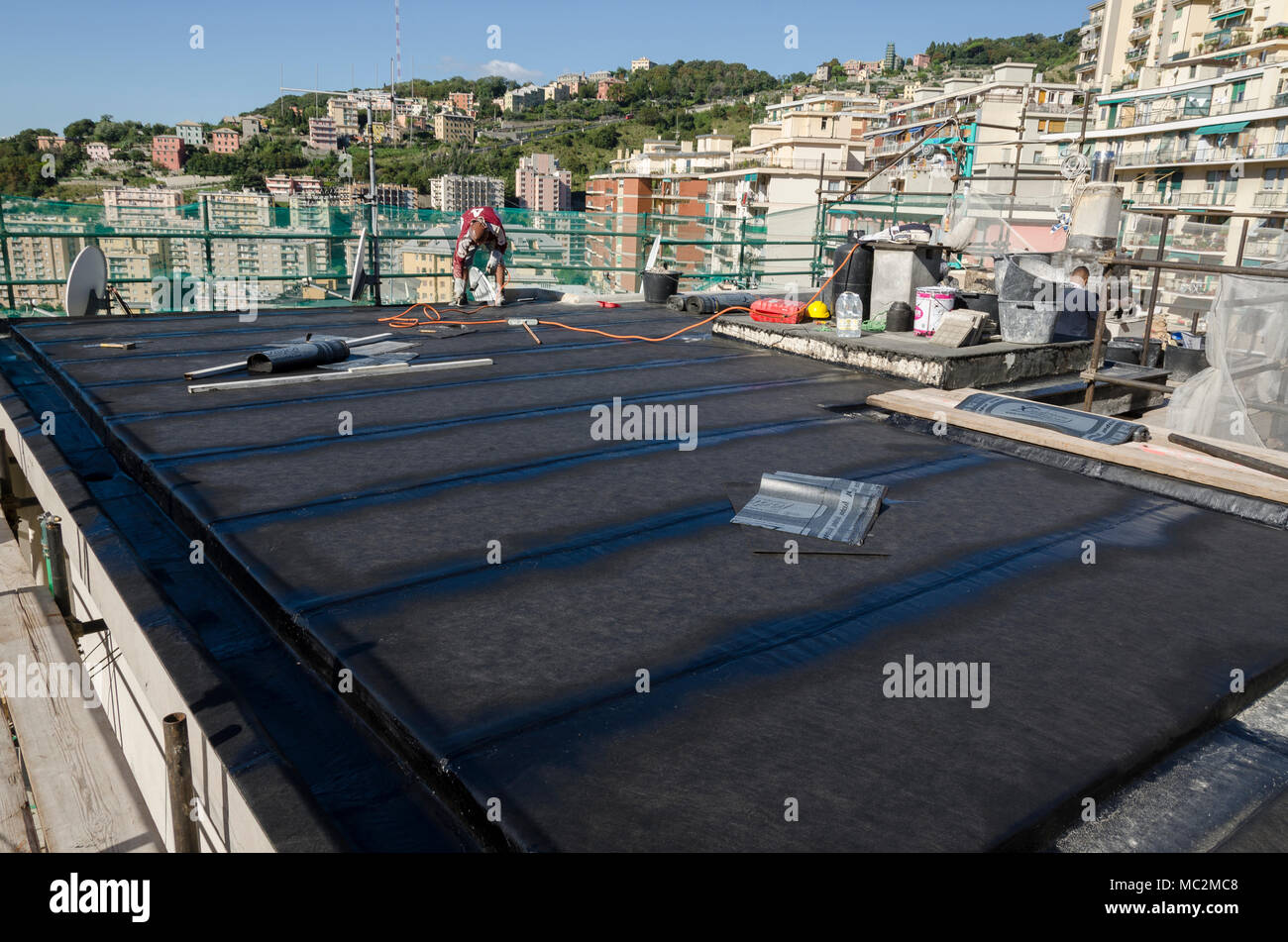 laying of waterproofing sheathing and insulation during the renovation ...