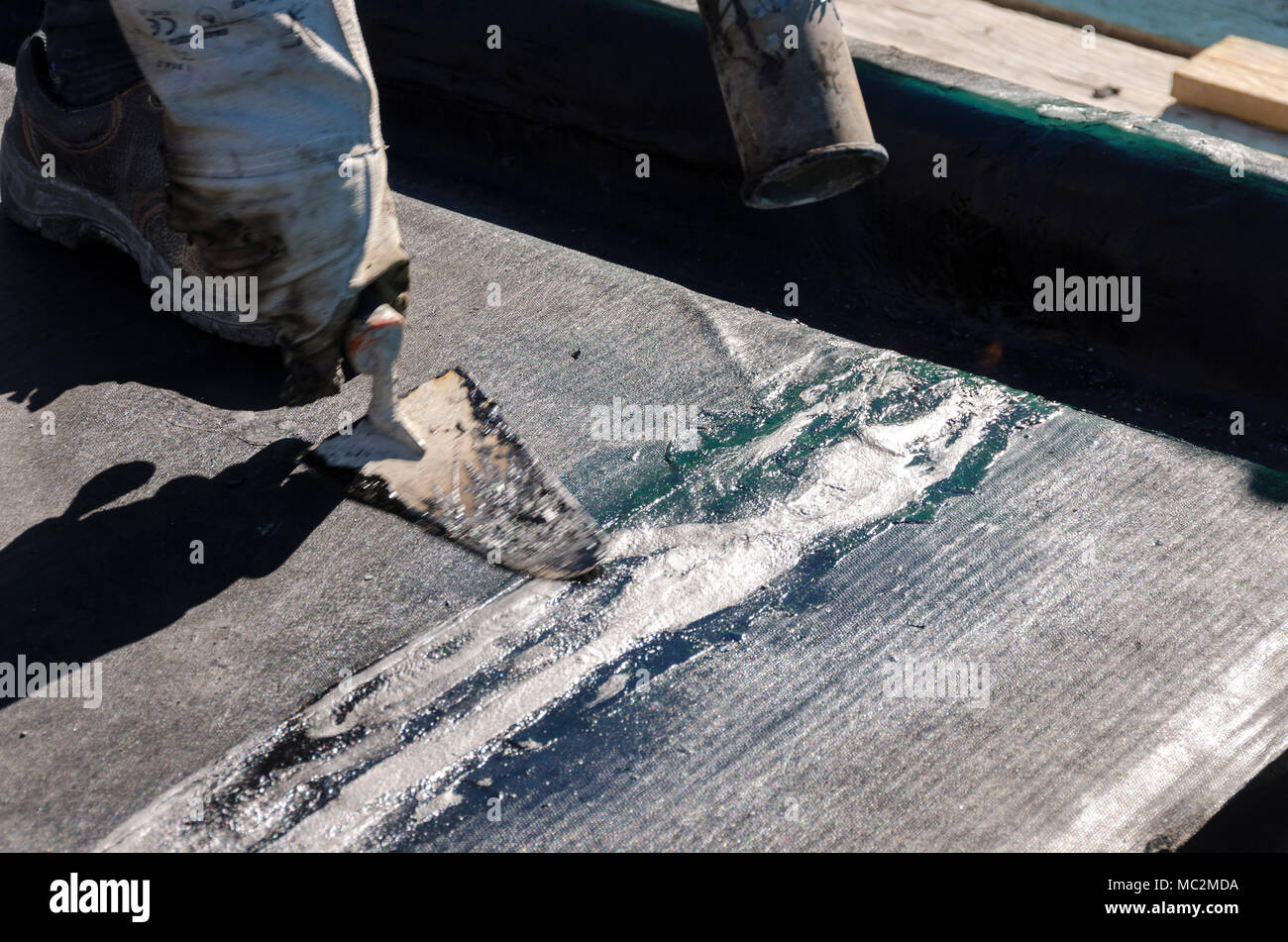 laying of waterproofing sheathing and insulation during the renovation ...