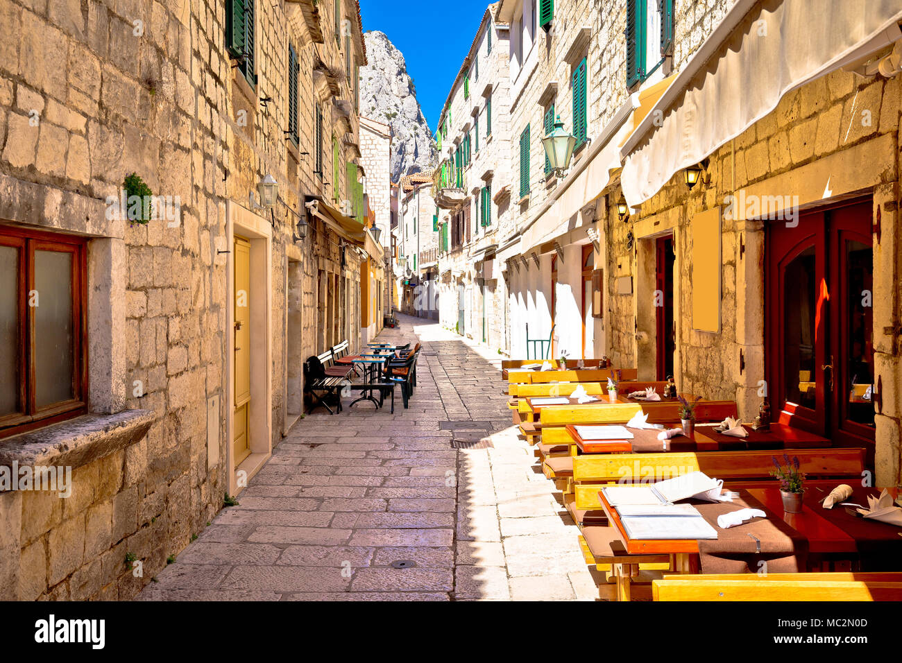 Stone narrow mediterranean street of Omis, Dalmatia region of Croatia ...