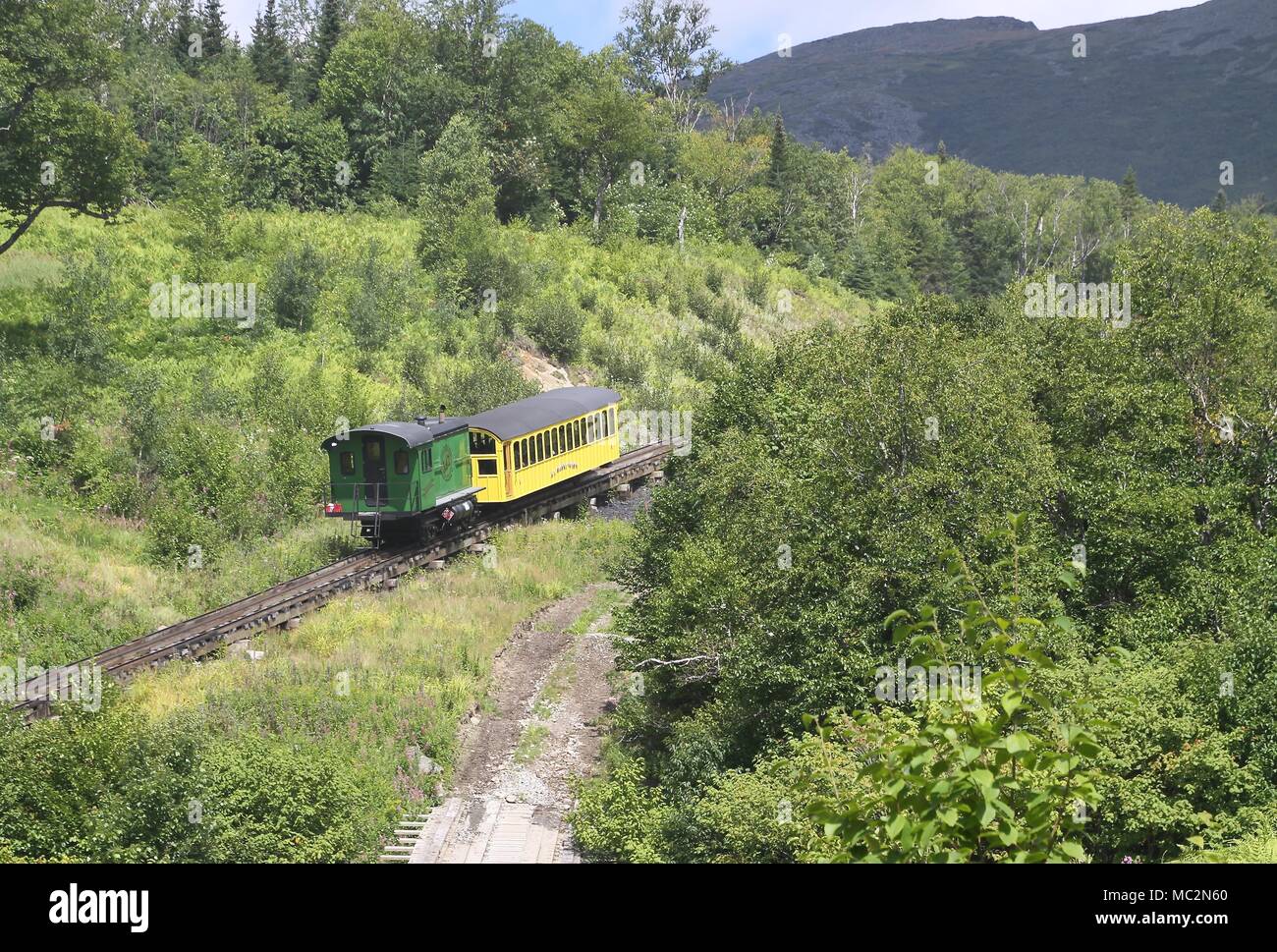 Rack and pinion locomotive pushing coach up the mountain on the Mt ...