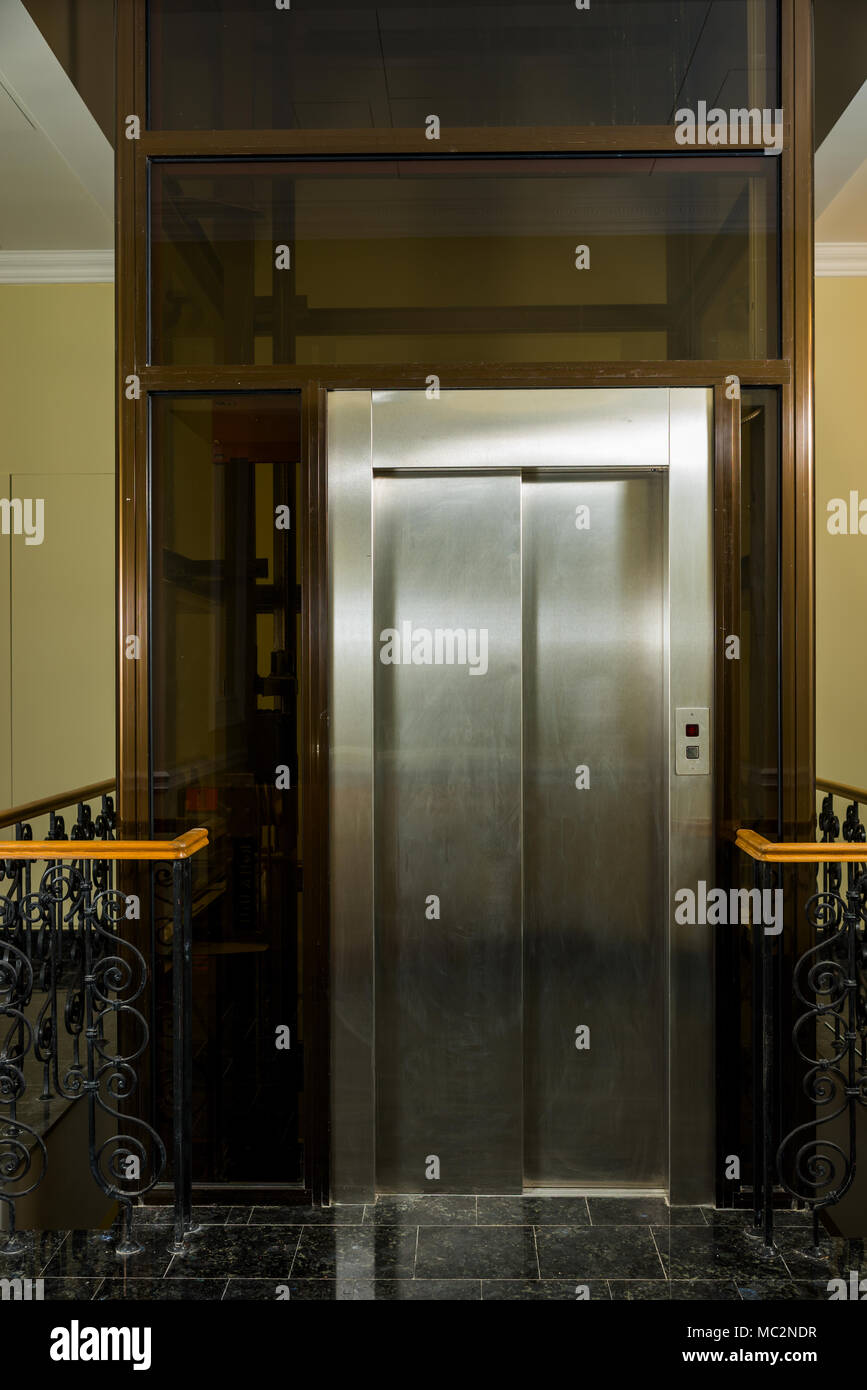 glass elevator shaft at the entrance Stock Photo - Alamy