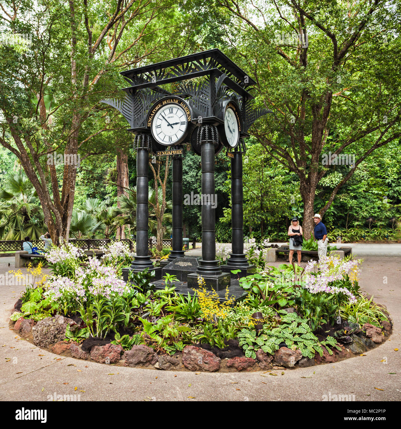 SINGAPORE - OCTOBER 17, 2014: Old Clock in The Singapore Botanic ...