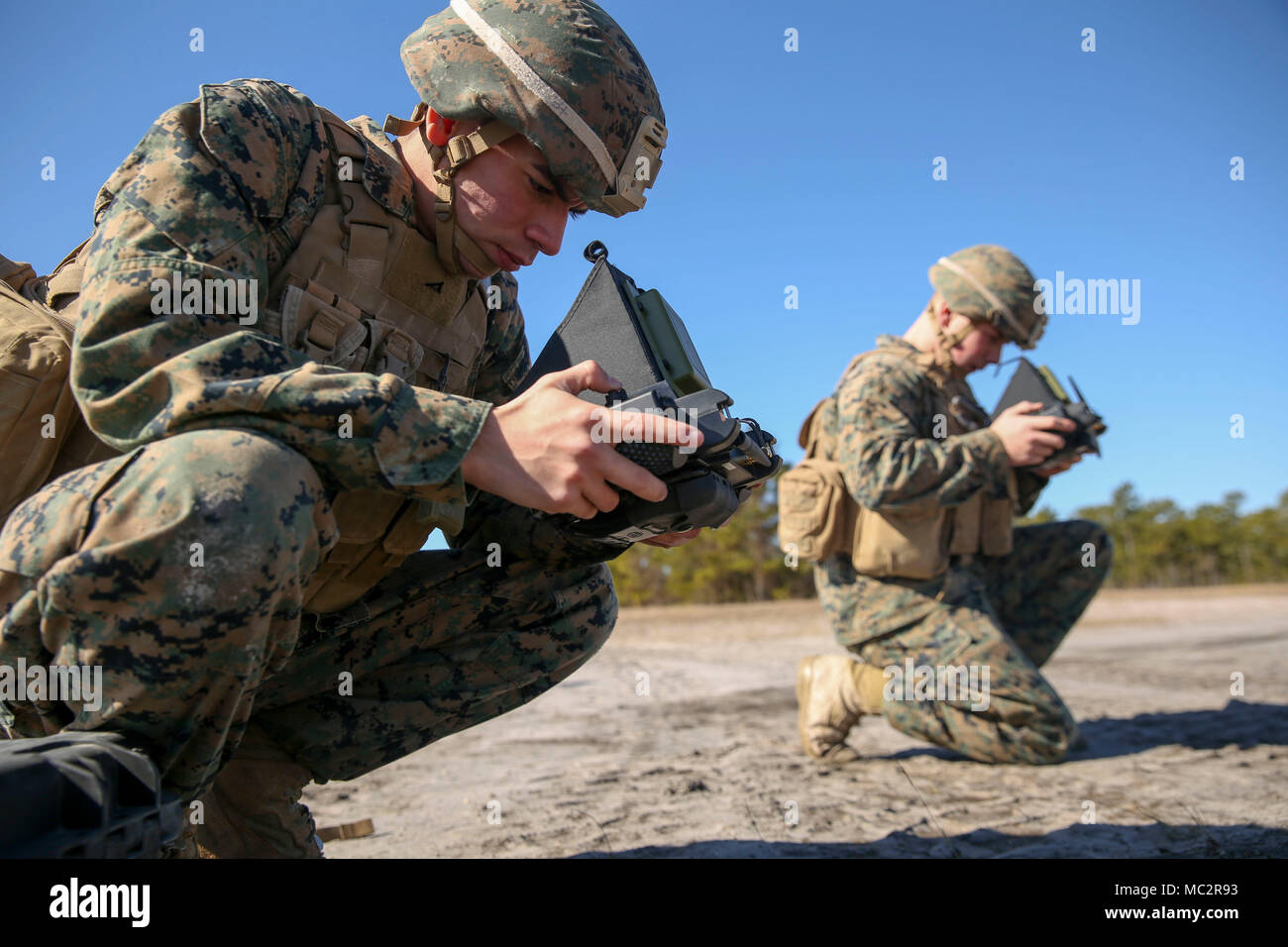 Marines view real-time feedback from cameras attached to unmanned ...