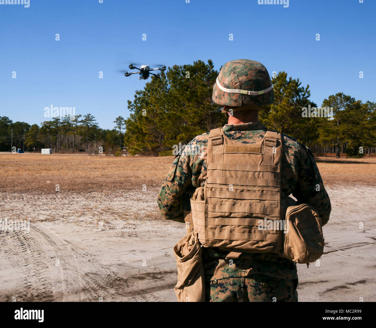 A forward observer navigates an unmanned aerial system to a target ...