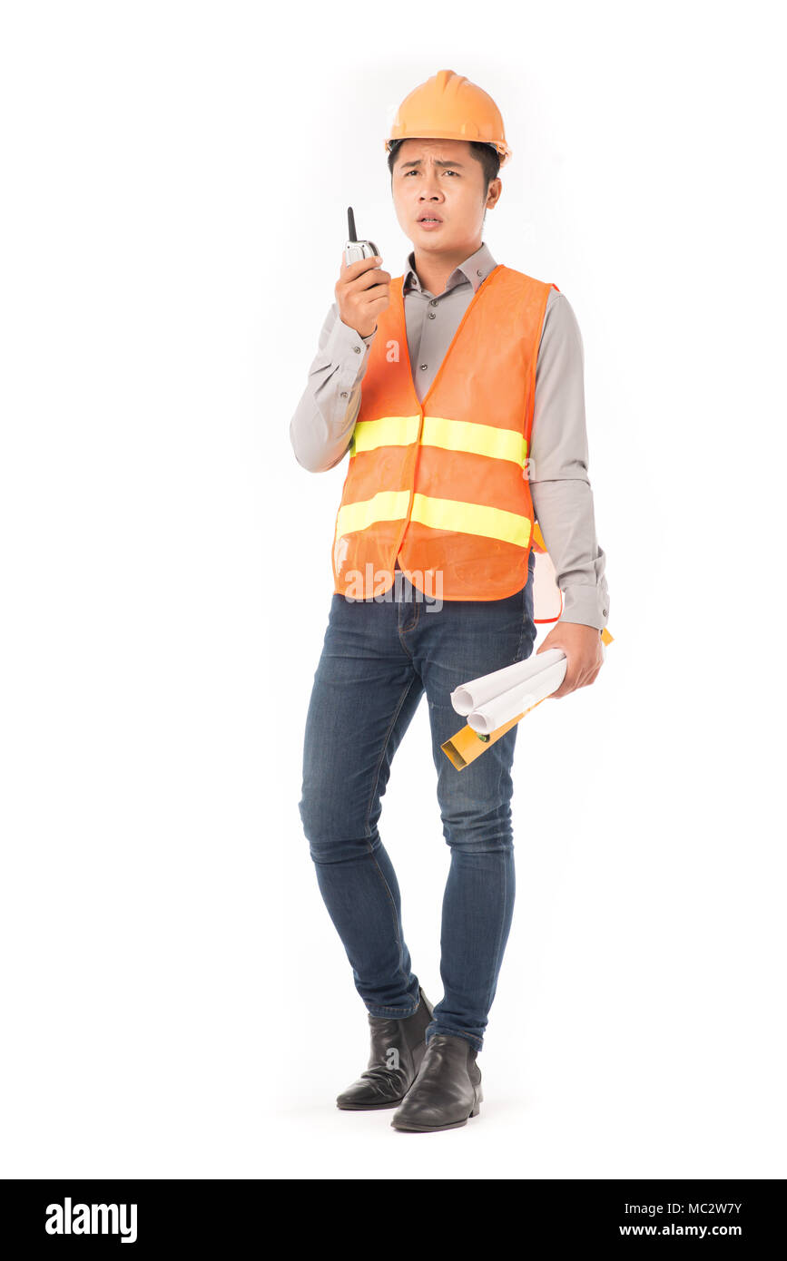 Construction worker in orange waistcoat Stock Photo - Alamy