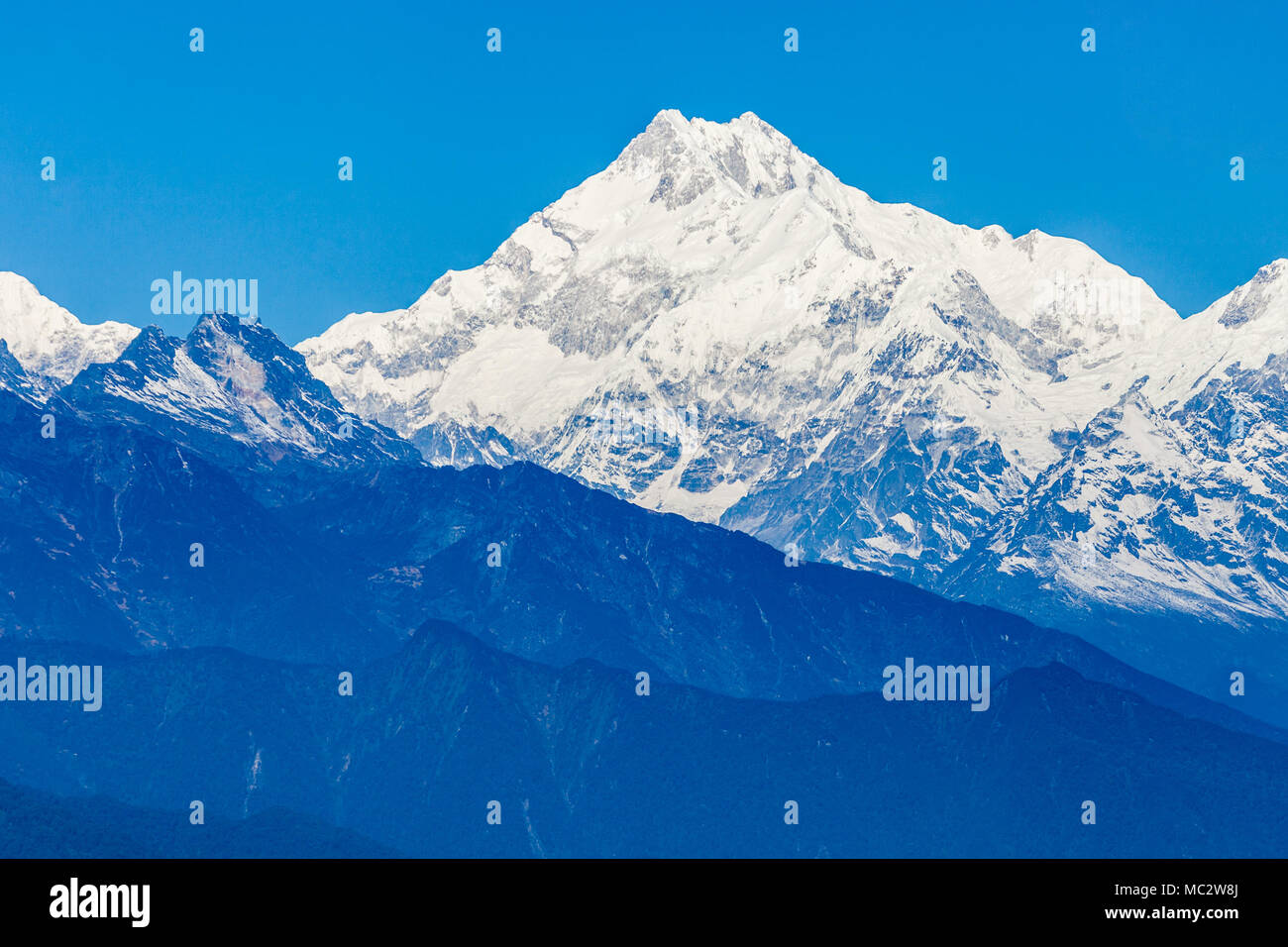 Kangchenjunga is the third highest mountain in the world, and lies ...