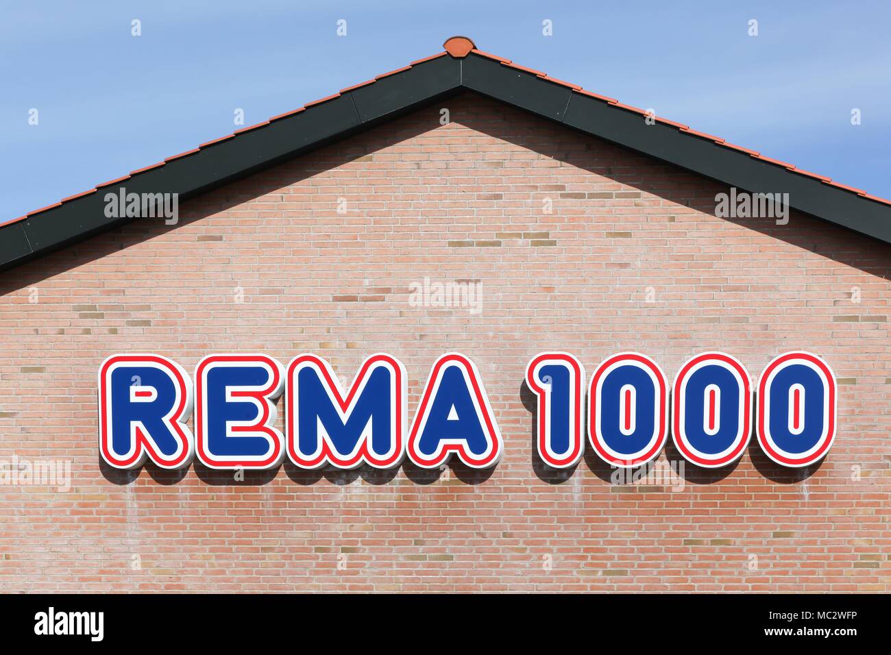 Torsted, Denmark - April 2, 2018: Rema 1000 logo on a facade. Rema 1000 ...