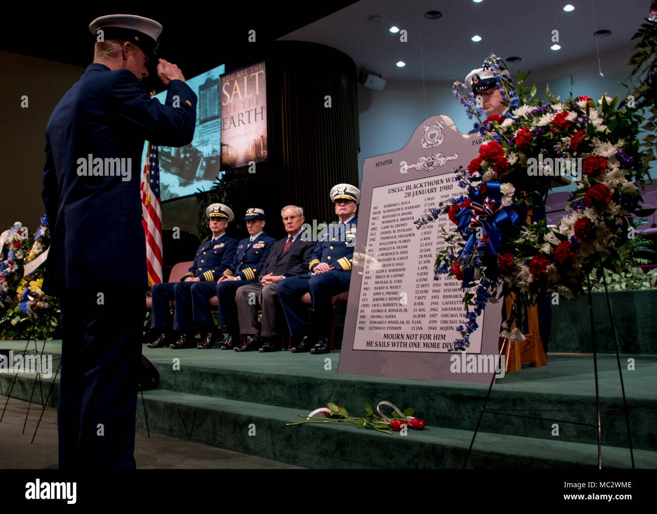 A crewmember from the Coast Guard Cutter Joshua Appleby, a 175-foot ...