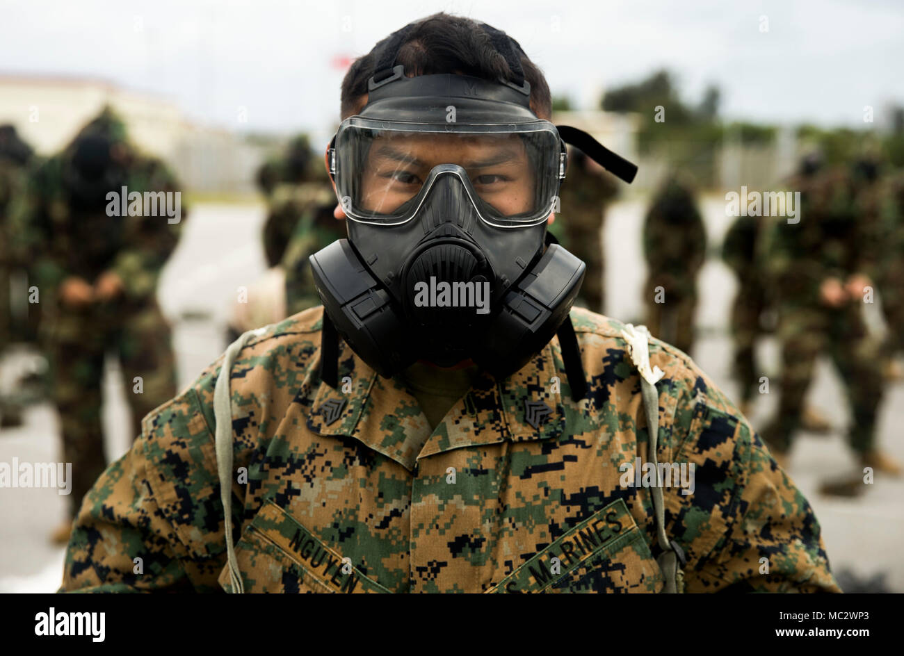 Sgt. Johnson Nguyen puts on mission oriented protected posture gear ...