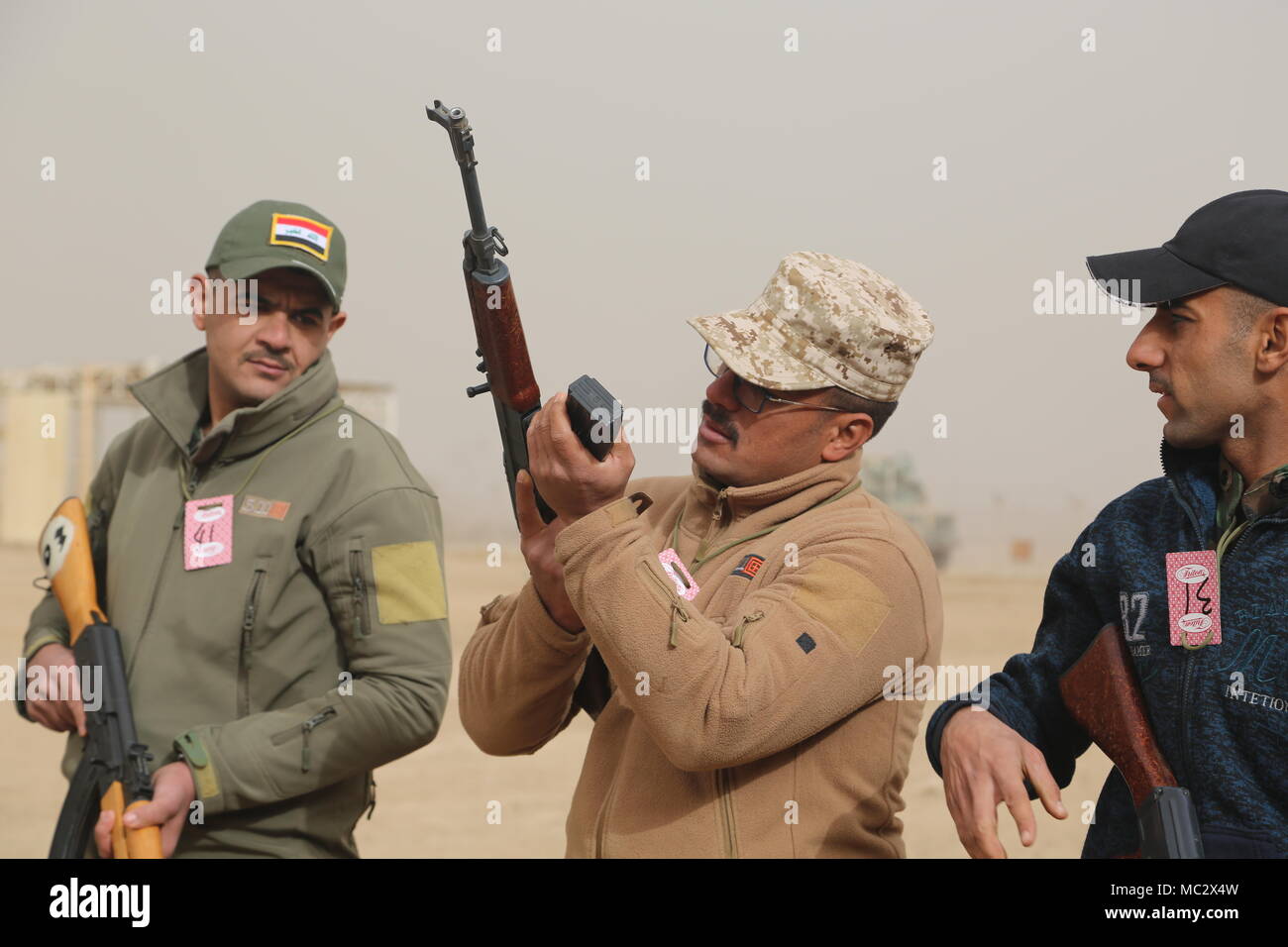 Iraqi soldier’s practice how to load and reload their AK47 rifles at ...