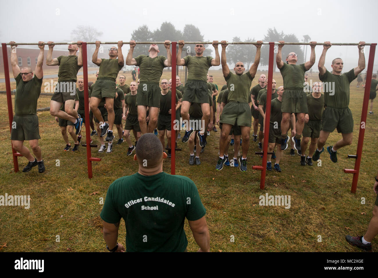 U.S. Marine officer candidates participate in physical training ...