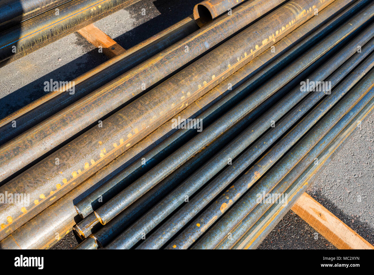 round metal rolled metal tubes Stock Photo - Alamy