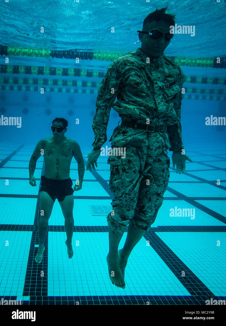 U.S. Marine Corps Pfc. Michael Garziano, an infantryman with Detachment ...