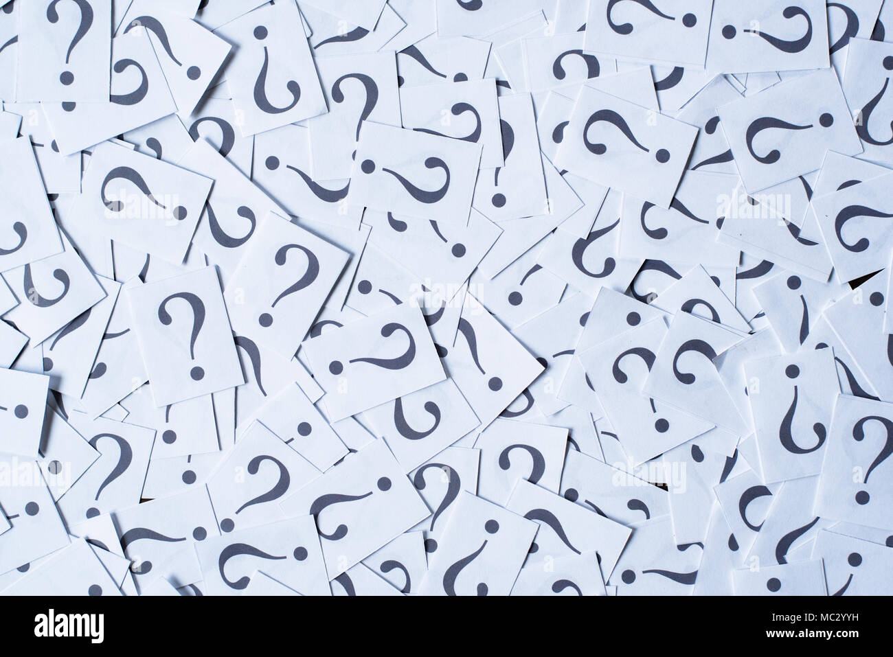 heap of white paper note with QUESTION MARK as background. FAQ and Q&A ...