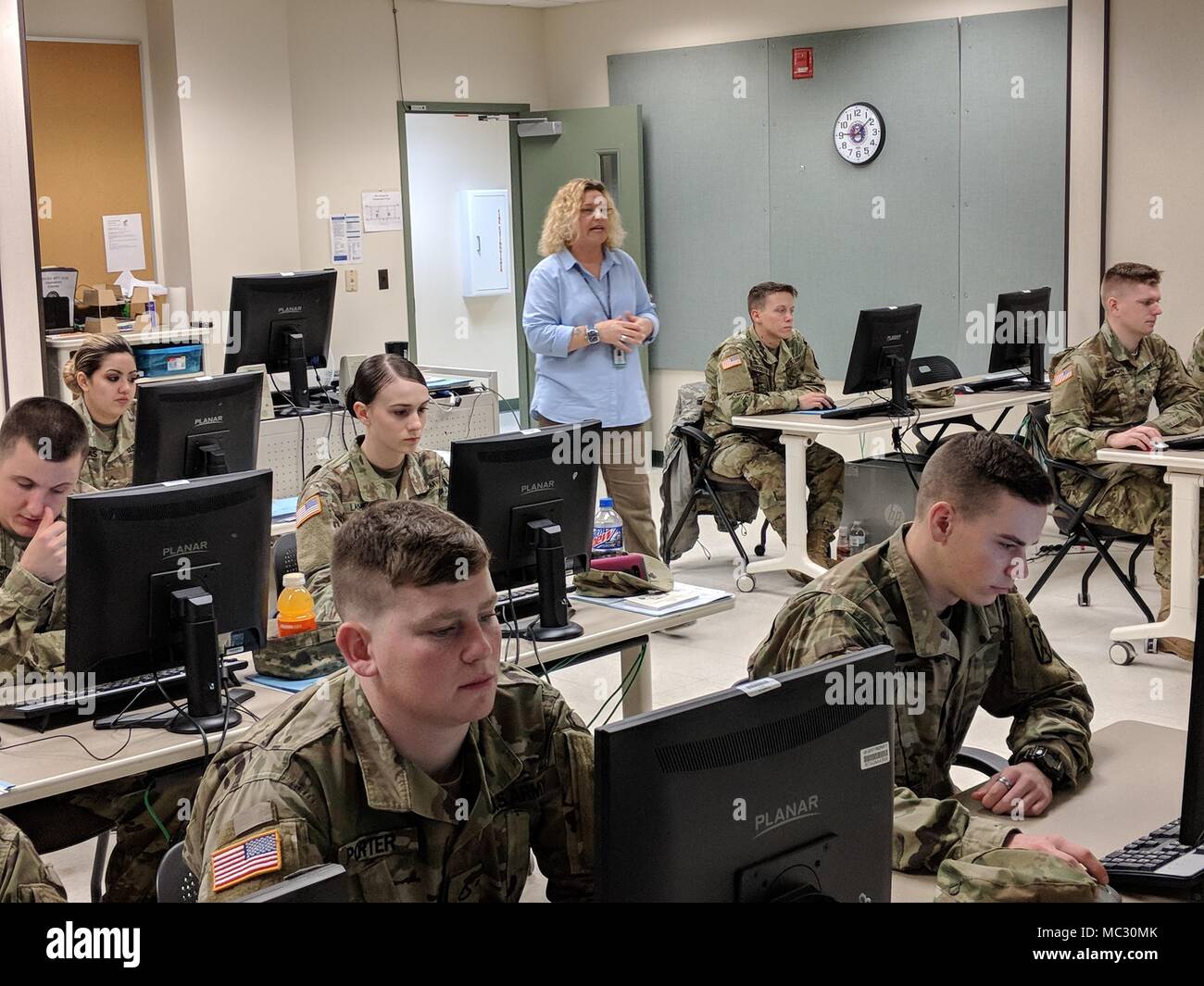 Beate Kinzel (center), lead instructor for the Joint Battle Command ...