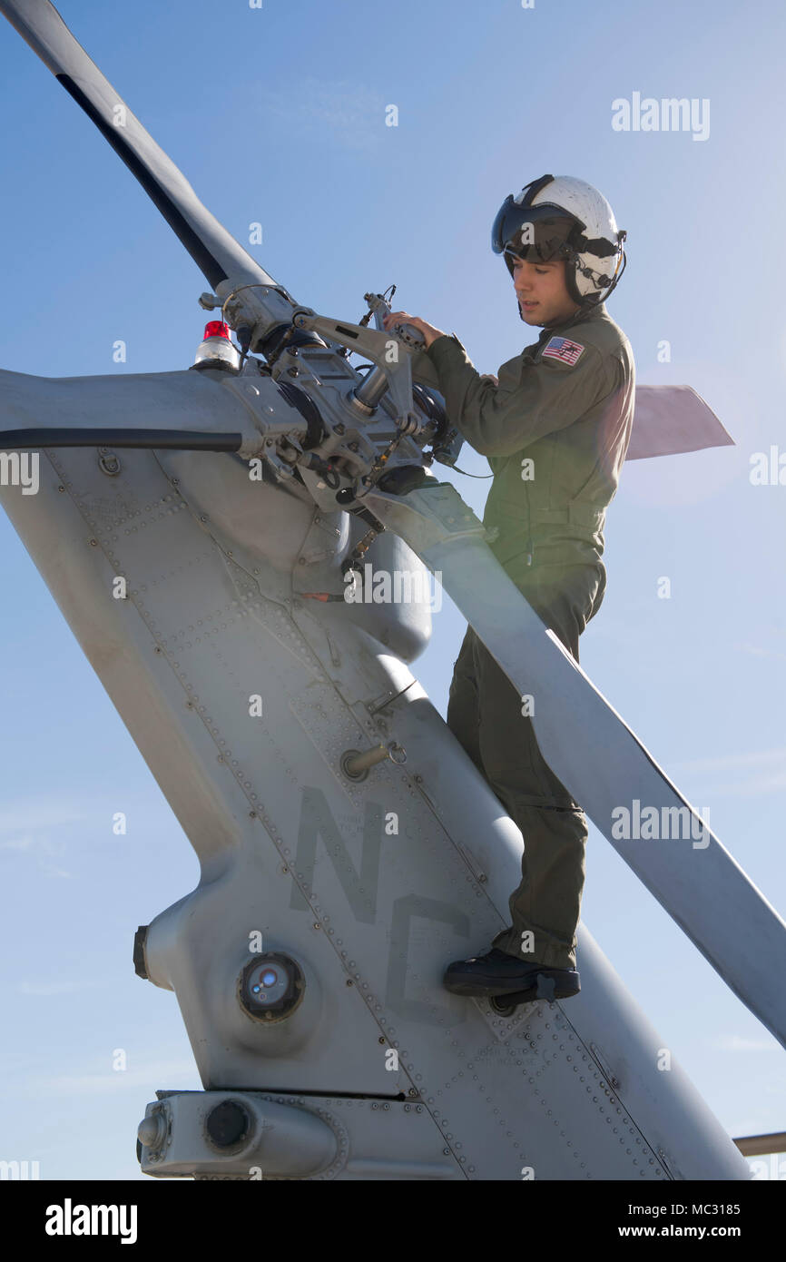 Naval Aircrewman Helicopter 3rd Class Matthew D’Aguiar, assigned to the ...