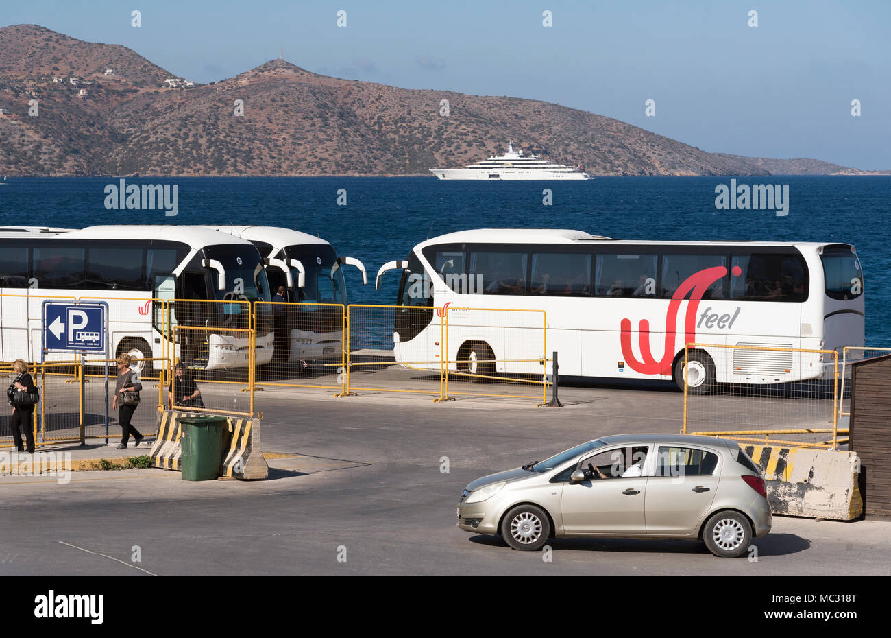 Tour bus parking area on the waterfront in Agios Nikolaos, Crete ...