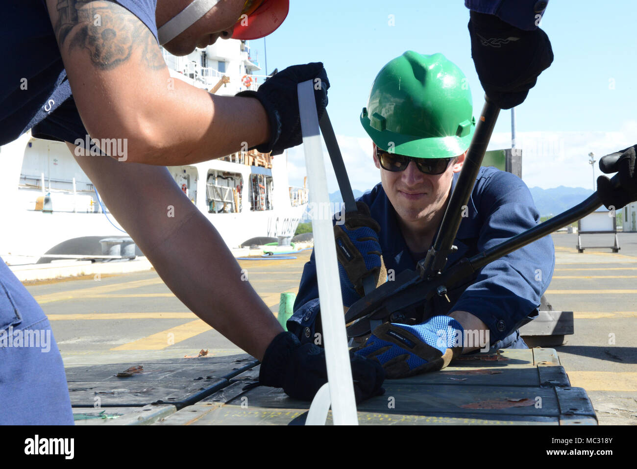 Petty Officer 2nd Class Reed Arrott, an electronics technician aboard ...