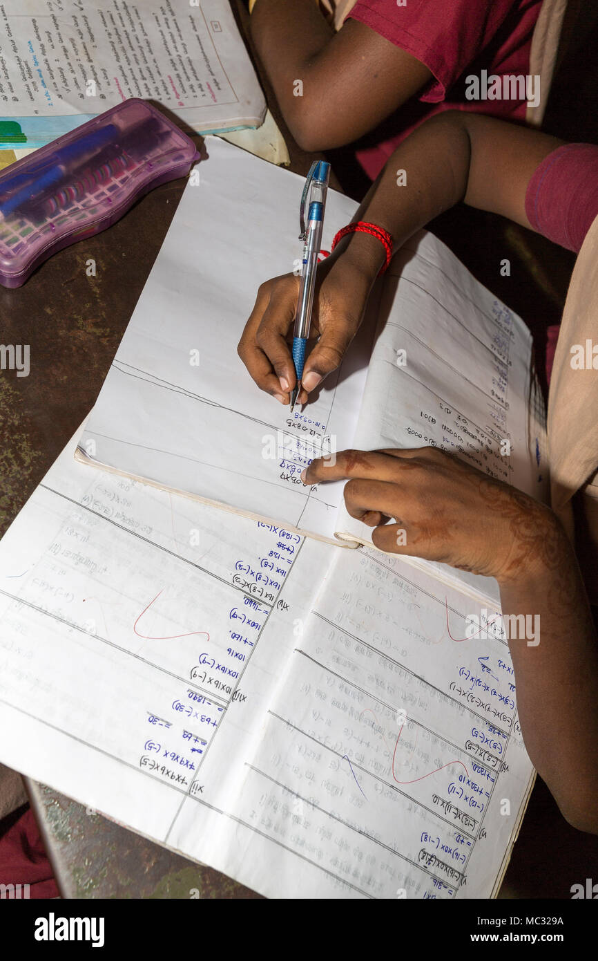 School children in classroom, with books and papers Stock Photo - Alamy