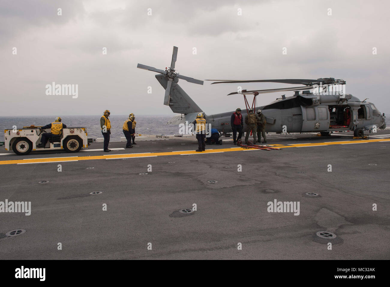 Us navy flight deck tractor hi-res stock photography and images - Alamy