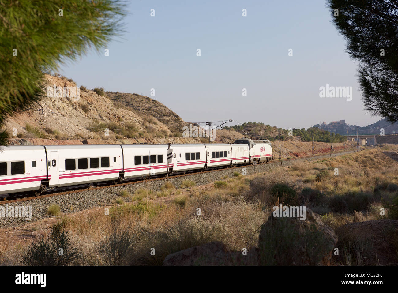 Renfe passenger train in the countryside of Spain Stock Photo - Alamy