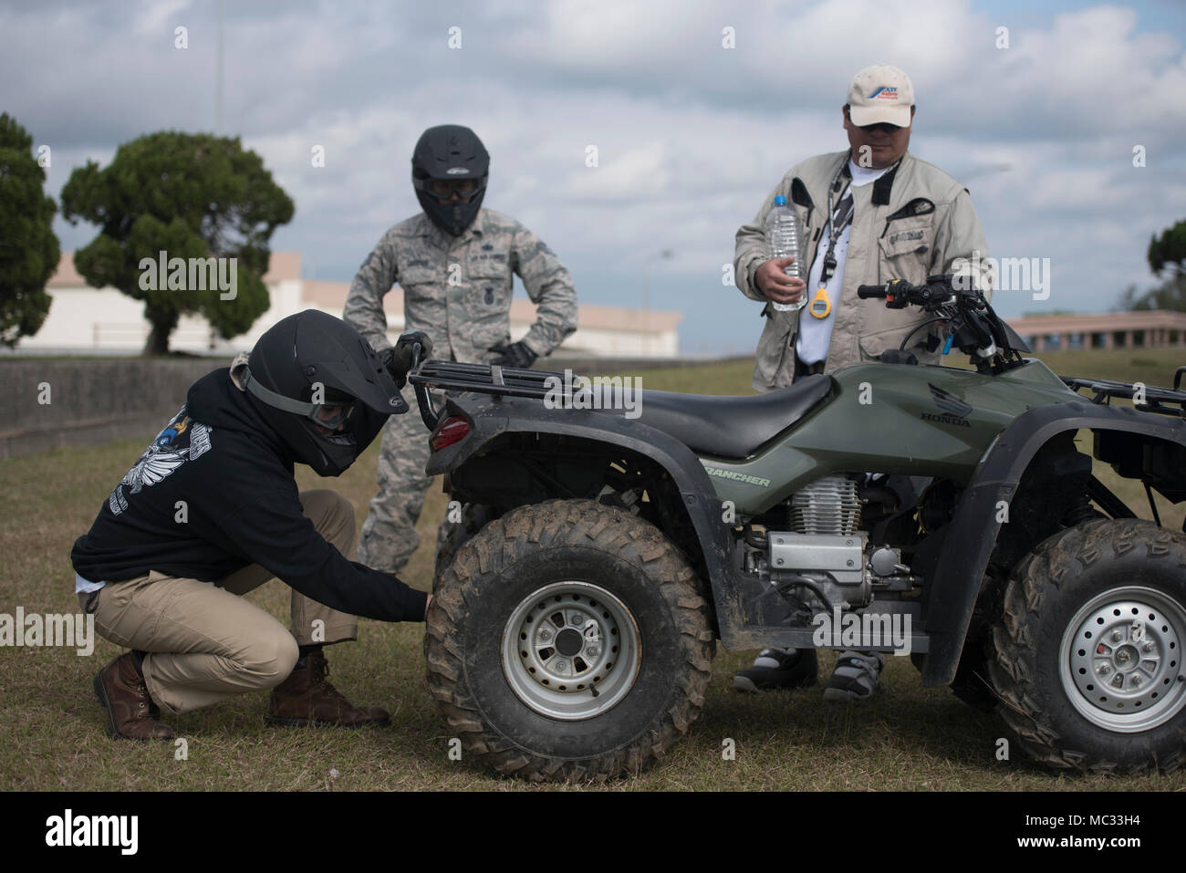 A U.S. Air Force Airman from the 18th Security Forces Squadron inspects ...