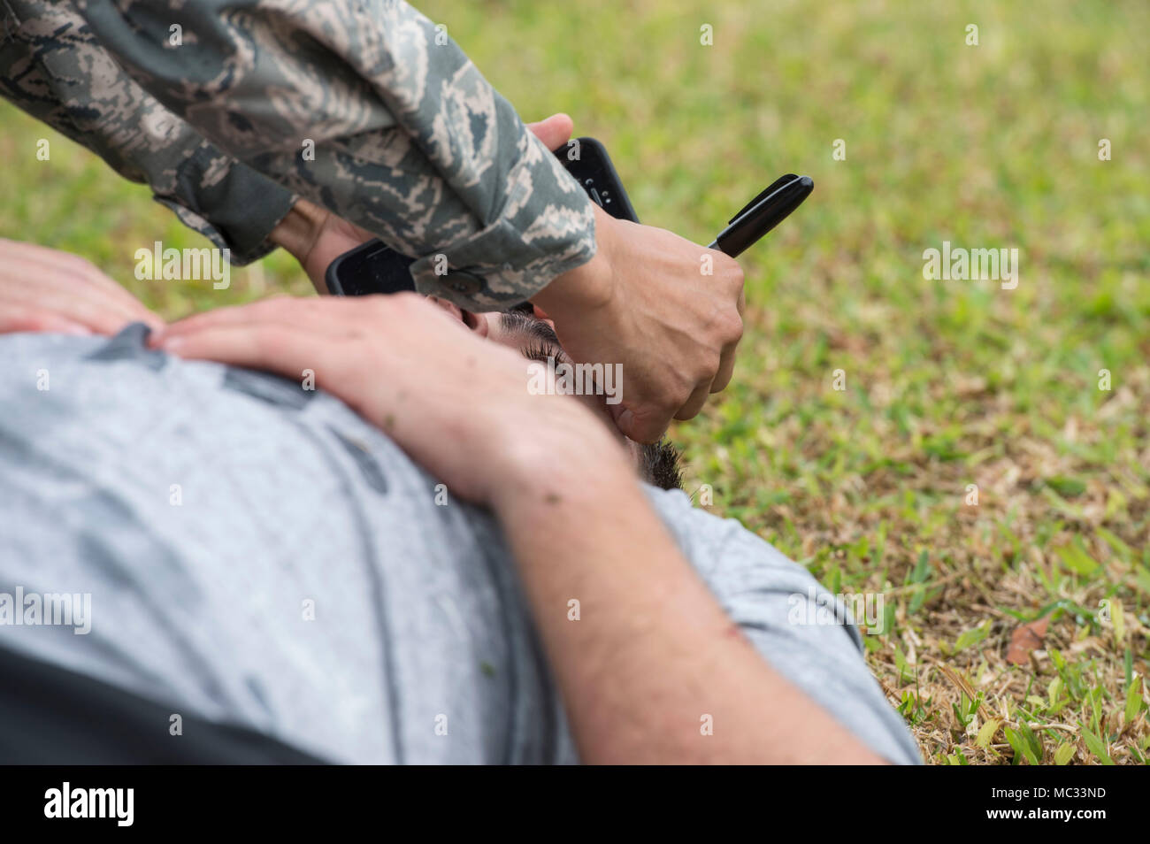 A simulated patient is treated during a joint field training exercise ...