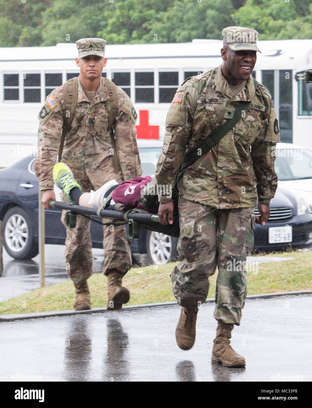 A simulated patient is treated during a joint field training exercise ...
