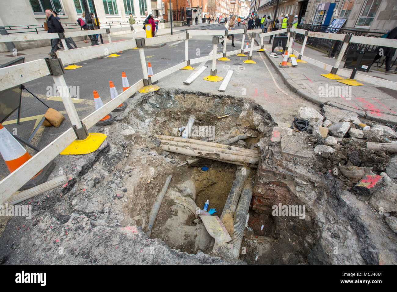 Pipes revealed on the Kingsway in London Stock Photo - Alamy
