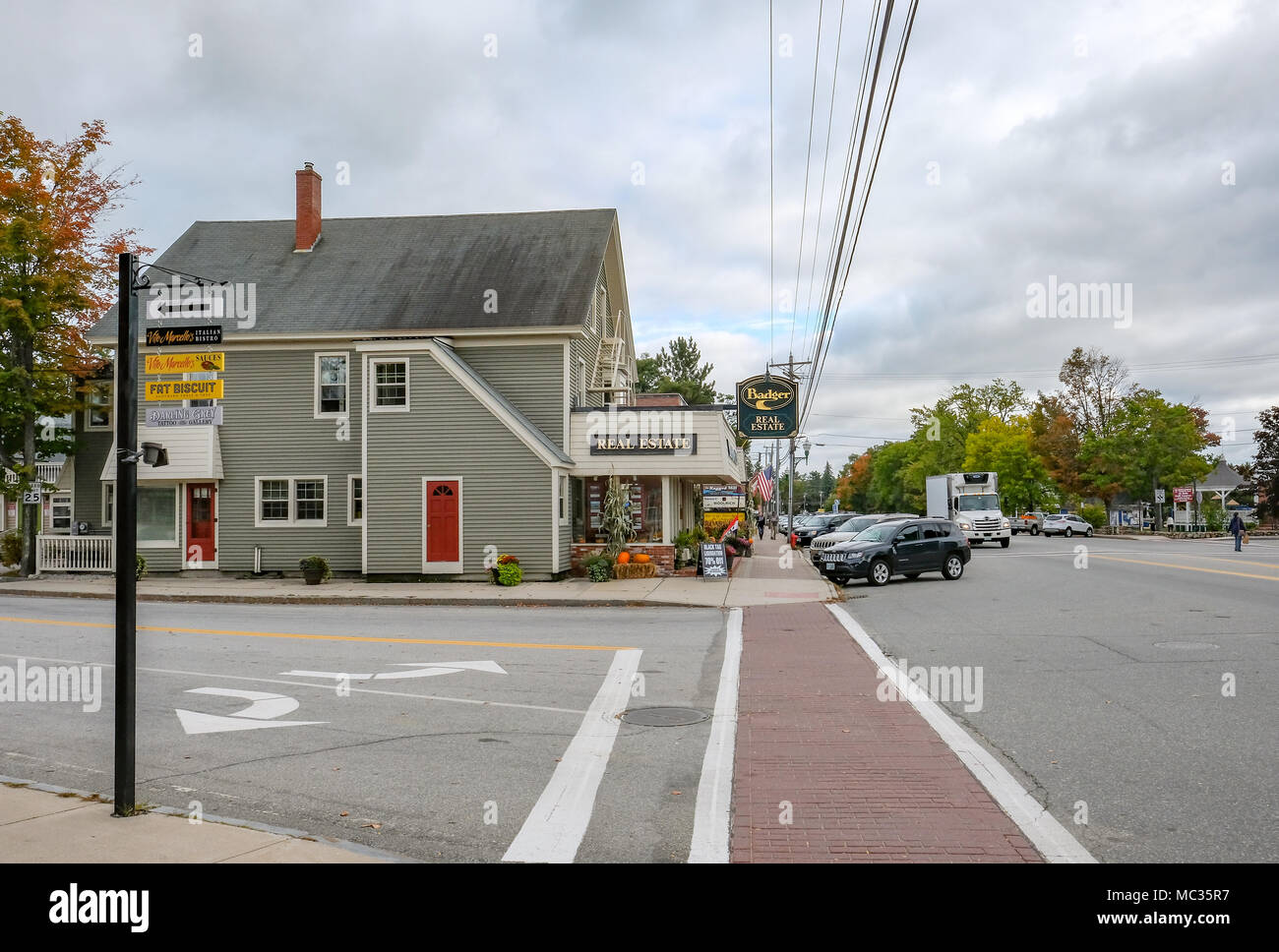Exterior view of an empty side street junction showing a timber-built ...