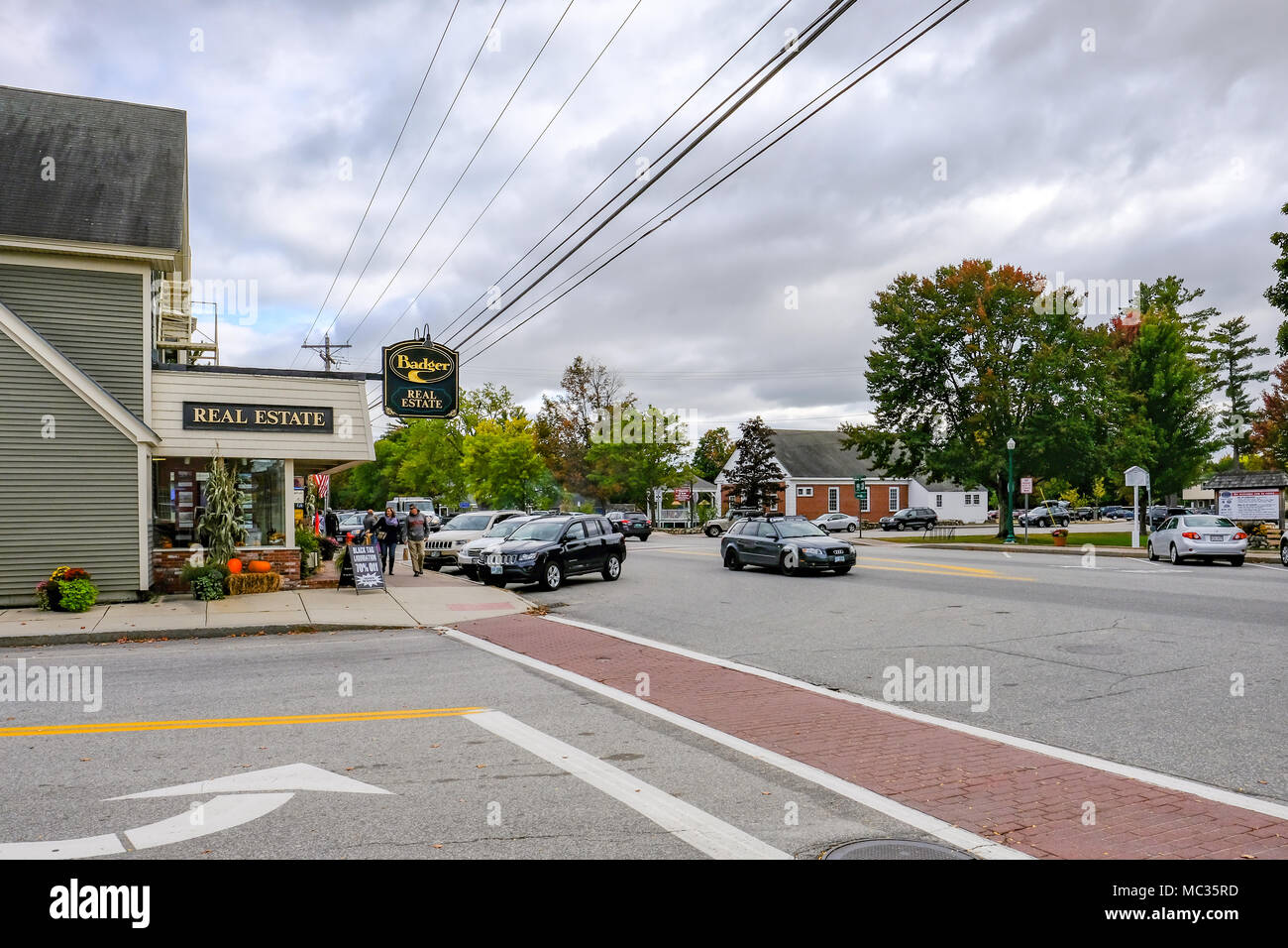 Exterior view of an empty side street junction showing a timber-built ...