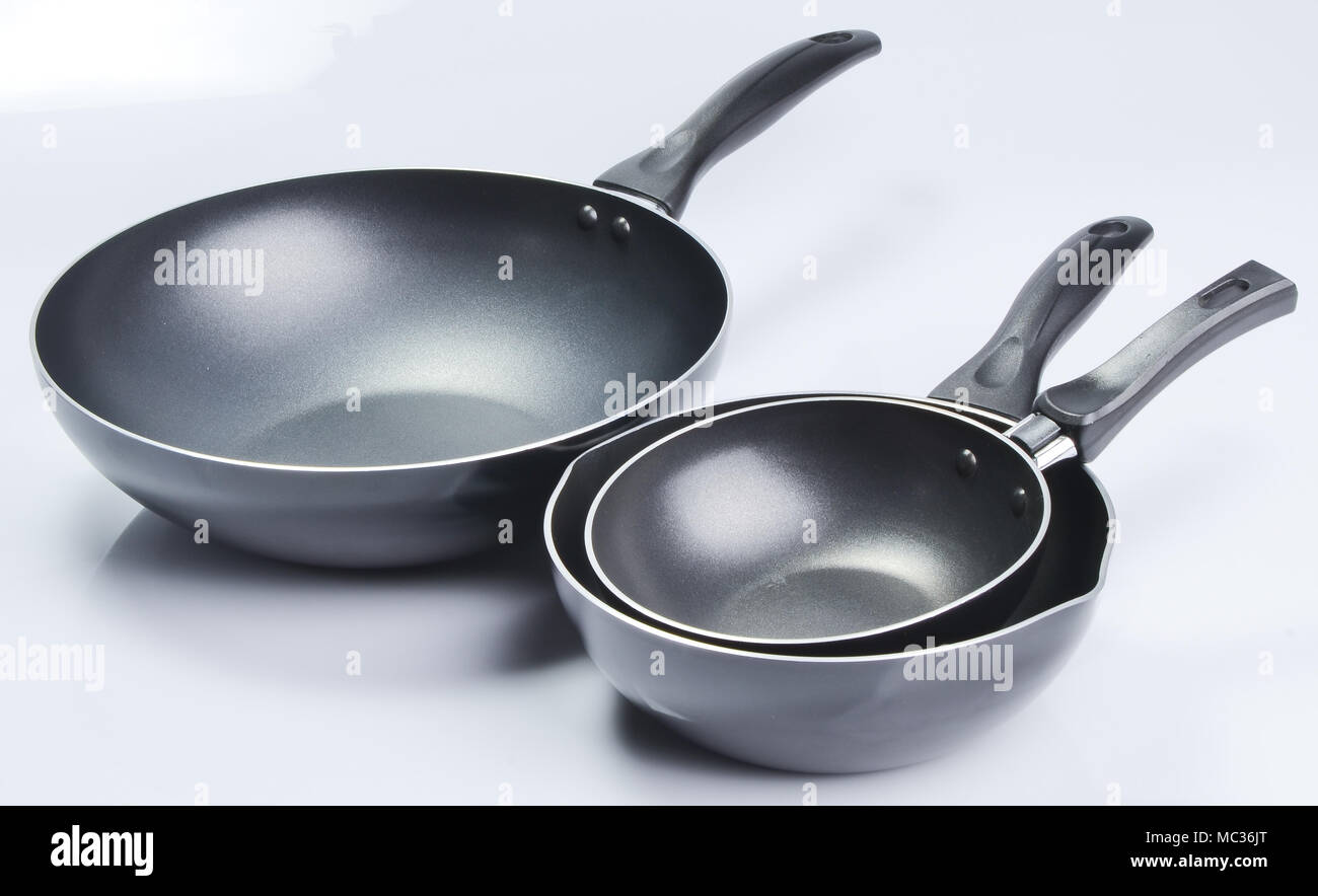Pan with handle on white background Stock Photo - Alamy