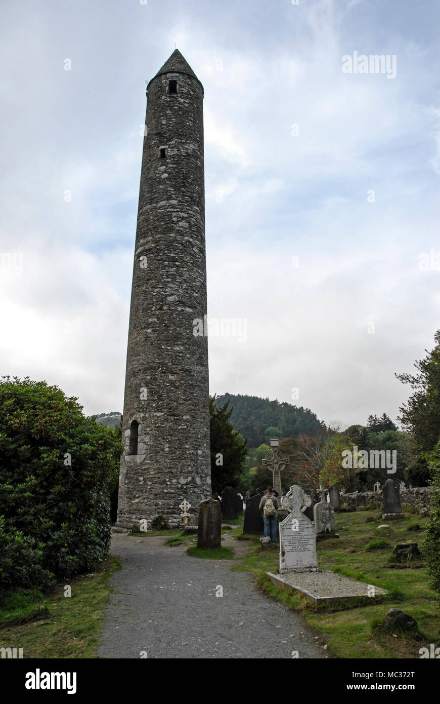 The 30 meters high Round Tower at Glendalough is in the valley of two ...