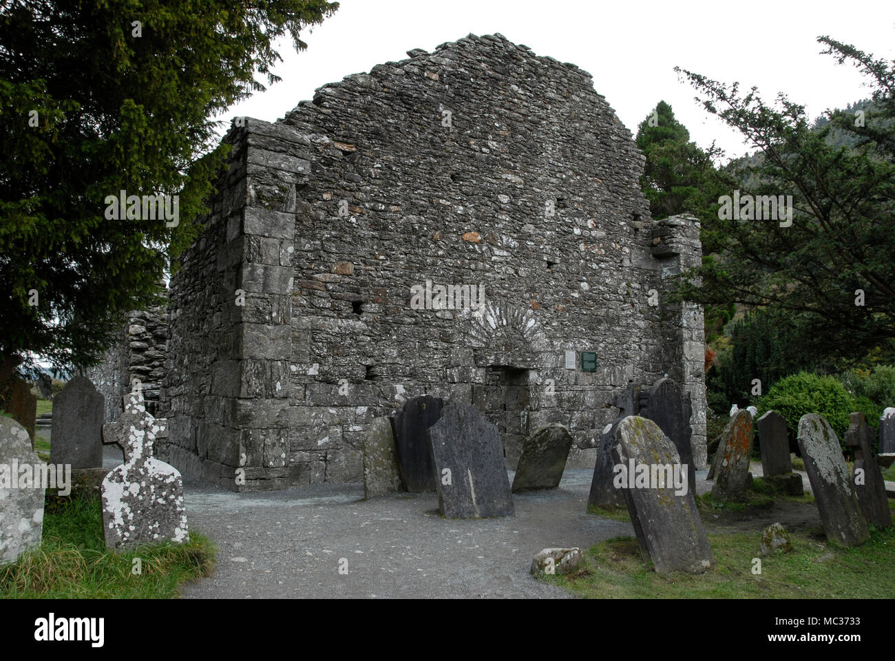 The ruins of the Cathedral at Glendalough in the valley of two lakes in ...
