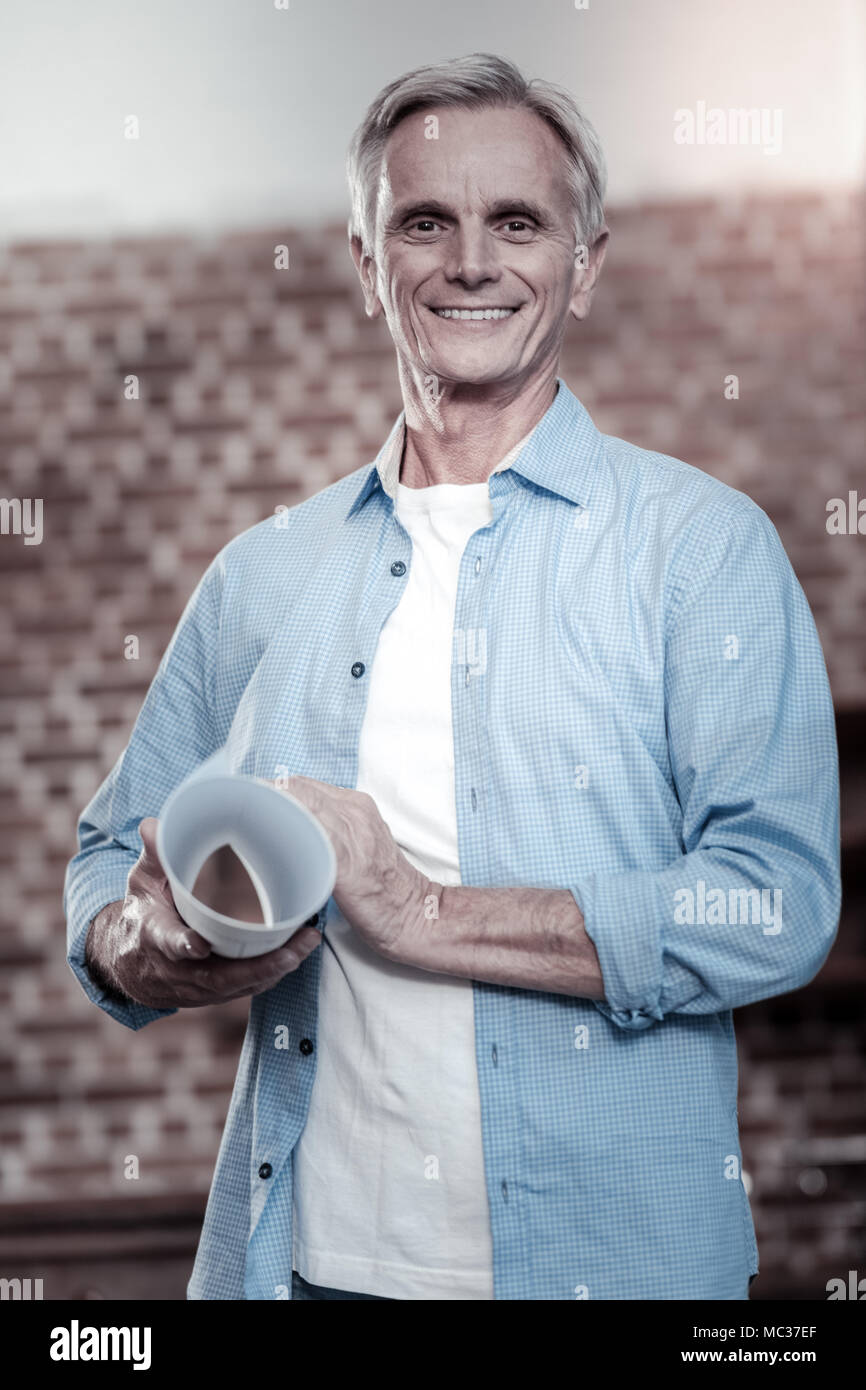 Confident male engineer completing project Stock Photo - Alamy