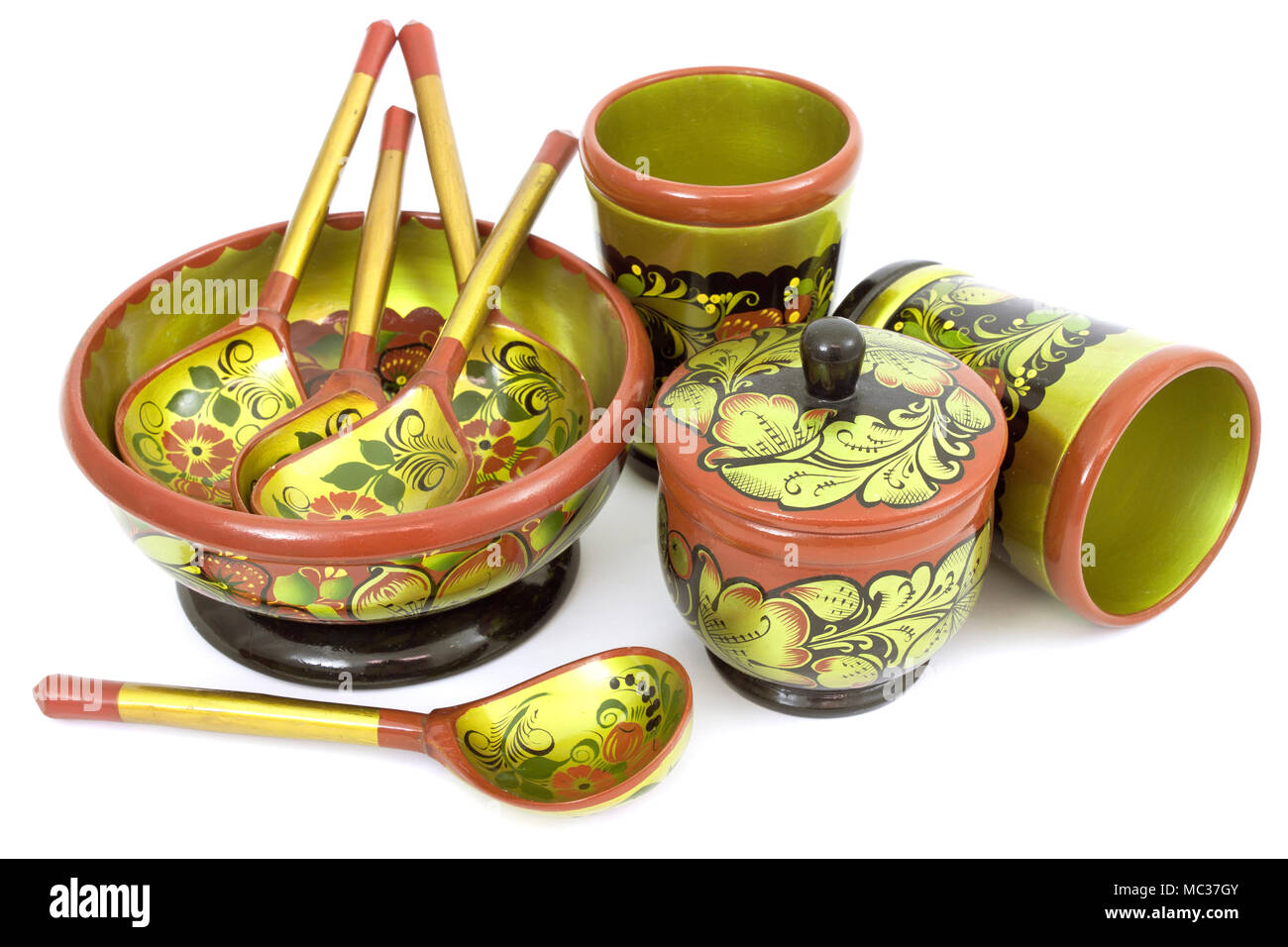 Wooden utensils of different sizes on a white background Stock Photo ...