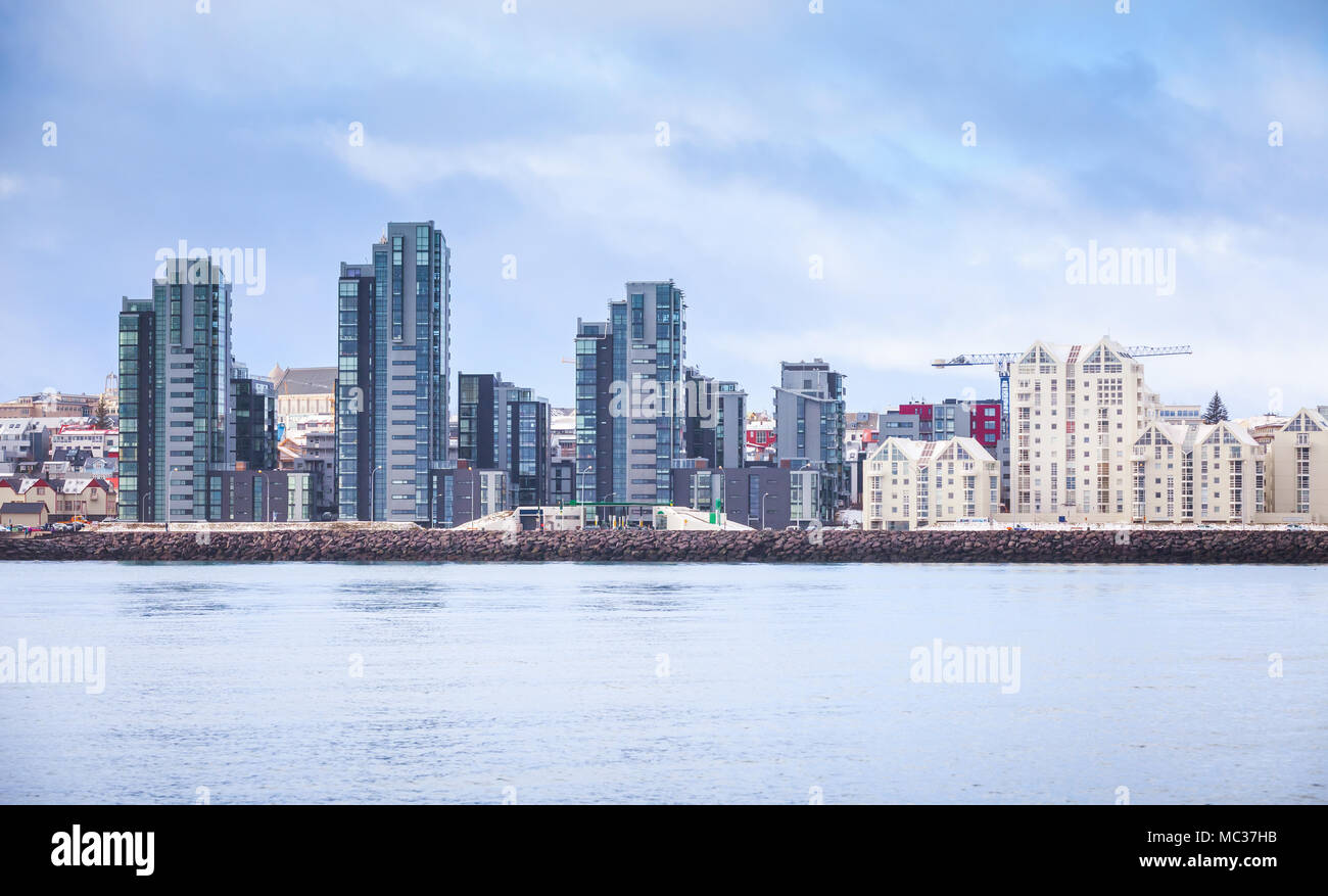 Urban skyline with tall modern buildings. Coastal cityscape of ...