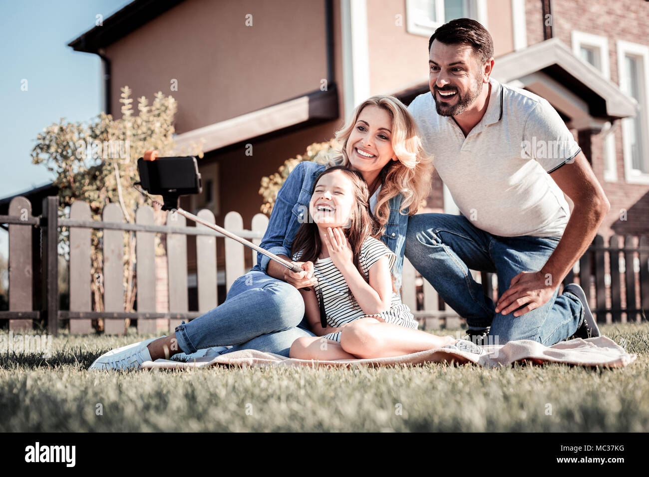 Strong family hi-res stock photography and images - Alamy